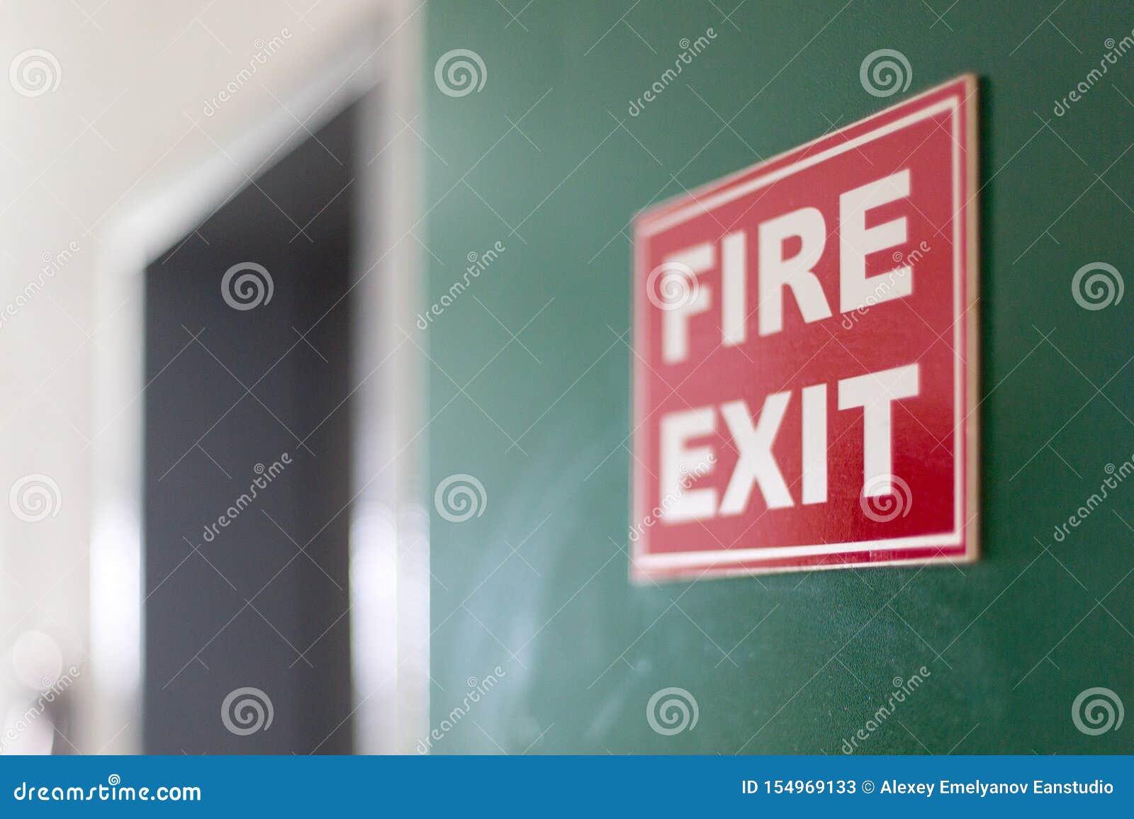 Emergency Exit Sign on Hotel Wall Stock Image - Image of design, arrow ...