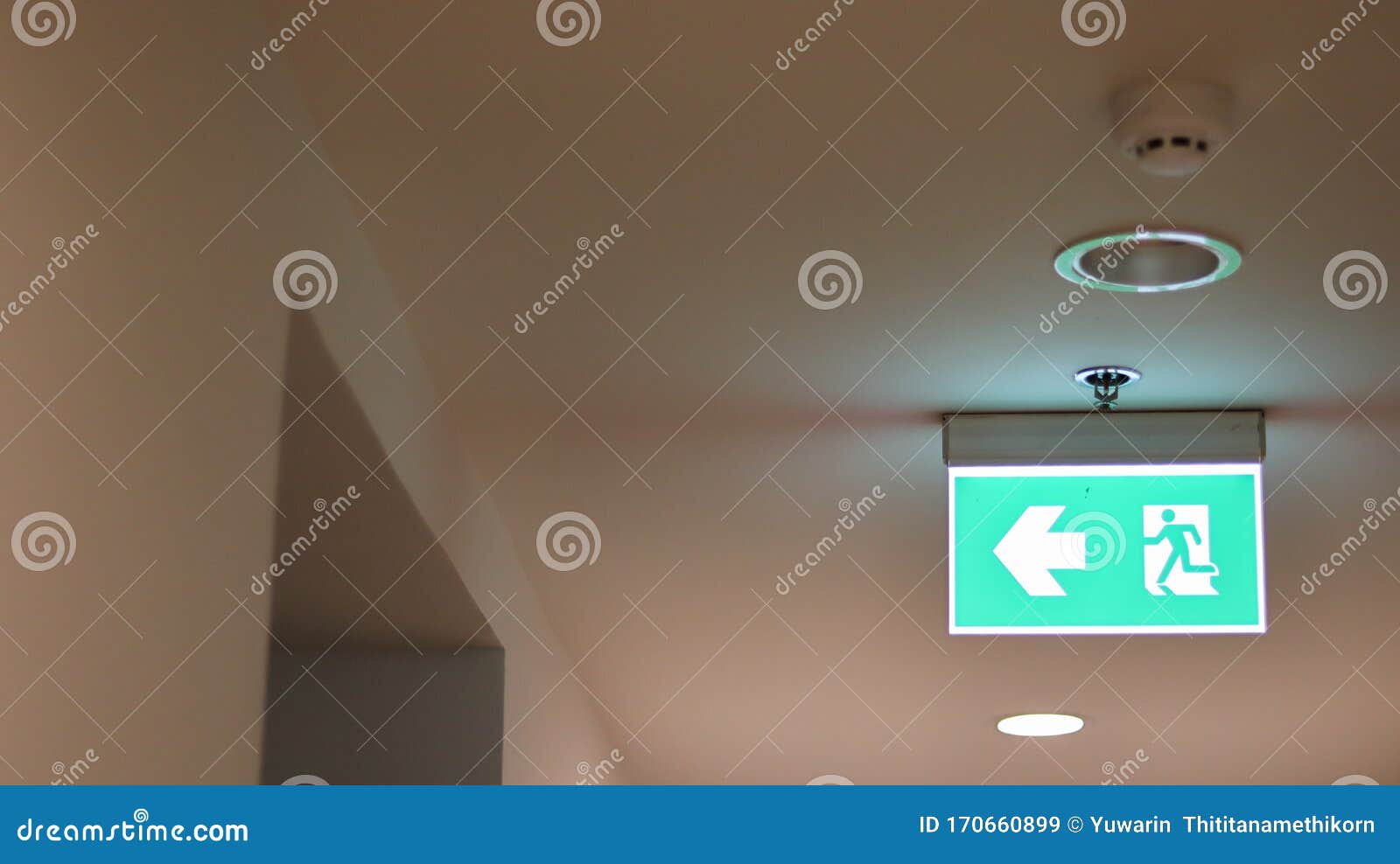 Emergency Exit Sign Illuminated in the Building Stock Image - Image of ...