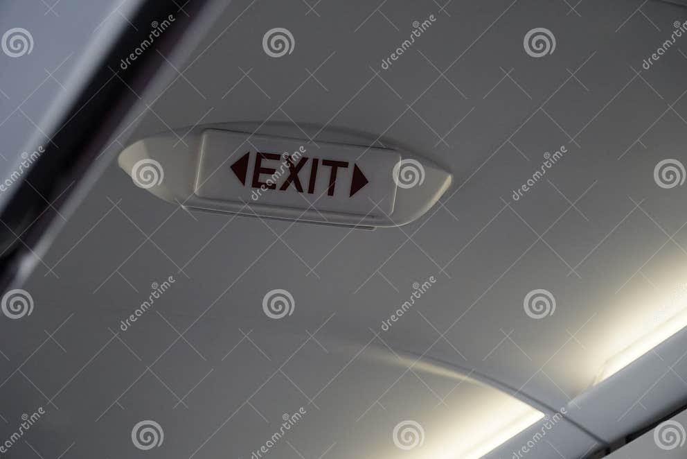 Emergency Exit Sign Inside an Airpane Stock Photo - Image of word, text ...
