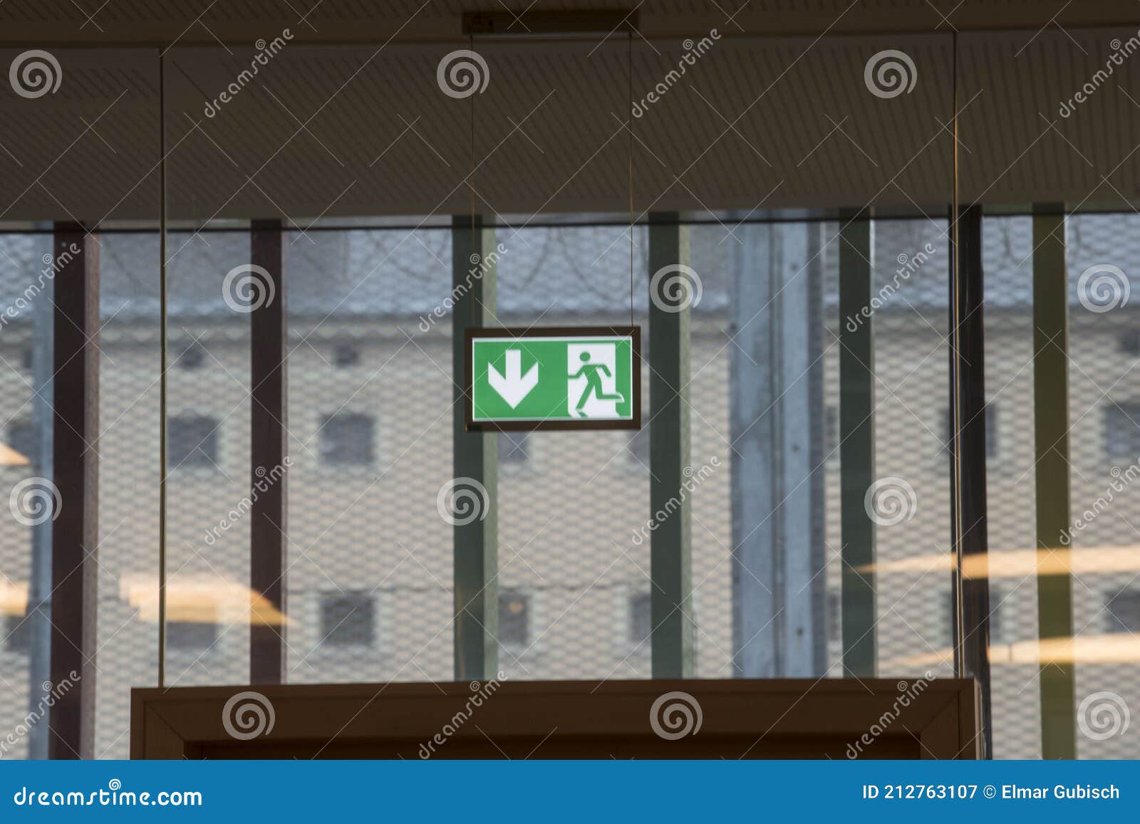 An Emergency Exit Sign in a Building Stock Image - Image of form ...