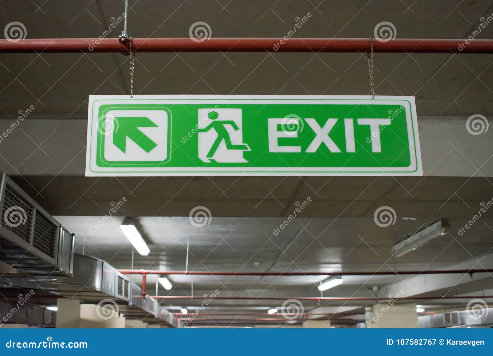 Emergency Exit Sign in the Parking. Stock Image - Image of guidance ...