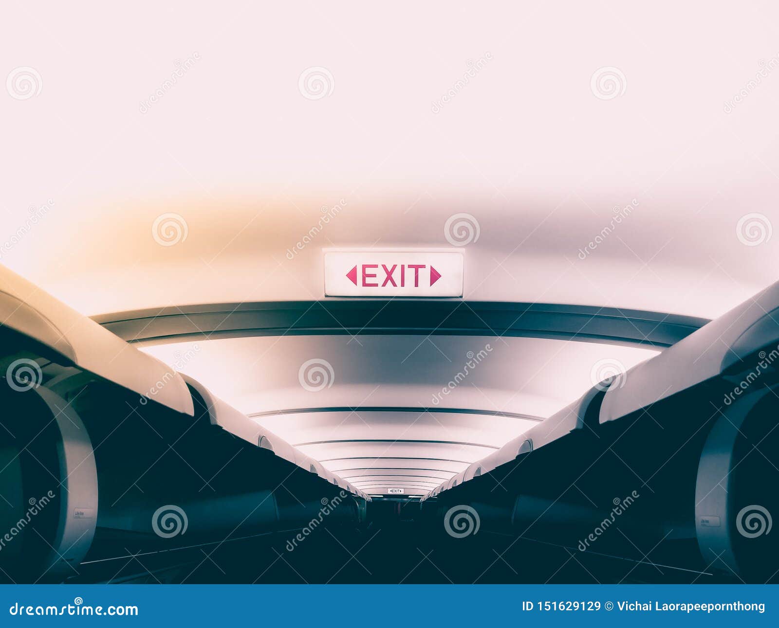 Emergency Exit Sign in Passenger Cabin of an Airplane. Stock Image ...