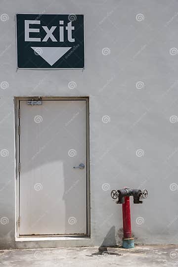 Emergency Exit Sign Showing the Way To Escape.Fire Exit in the Building ...