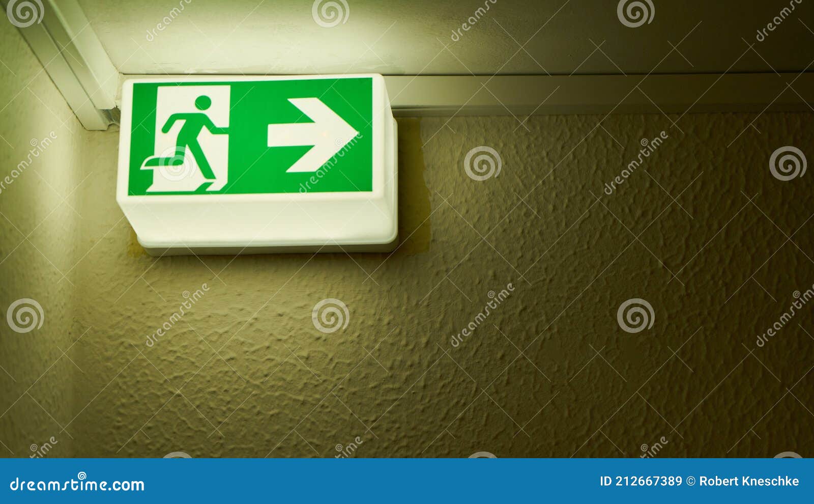 Emergency Exit Sign on Wall in House As a Notice Sign Stock Image ...