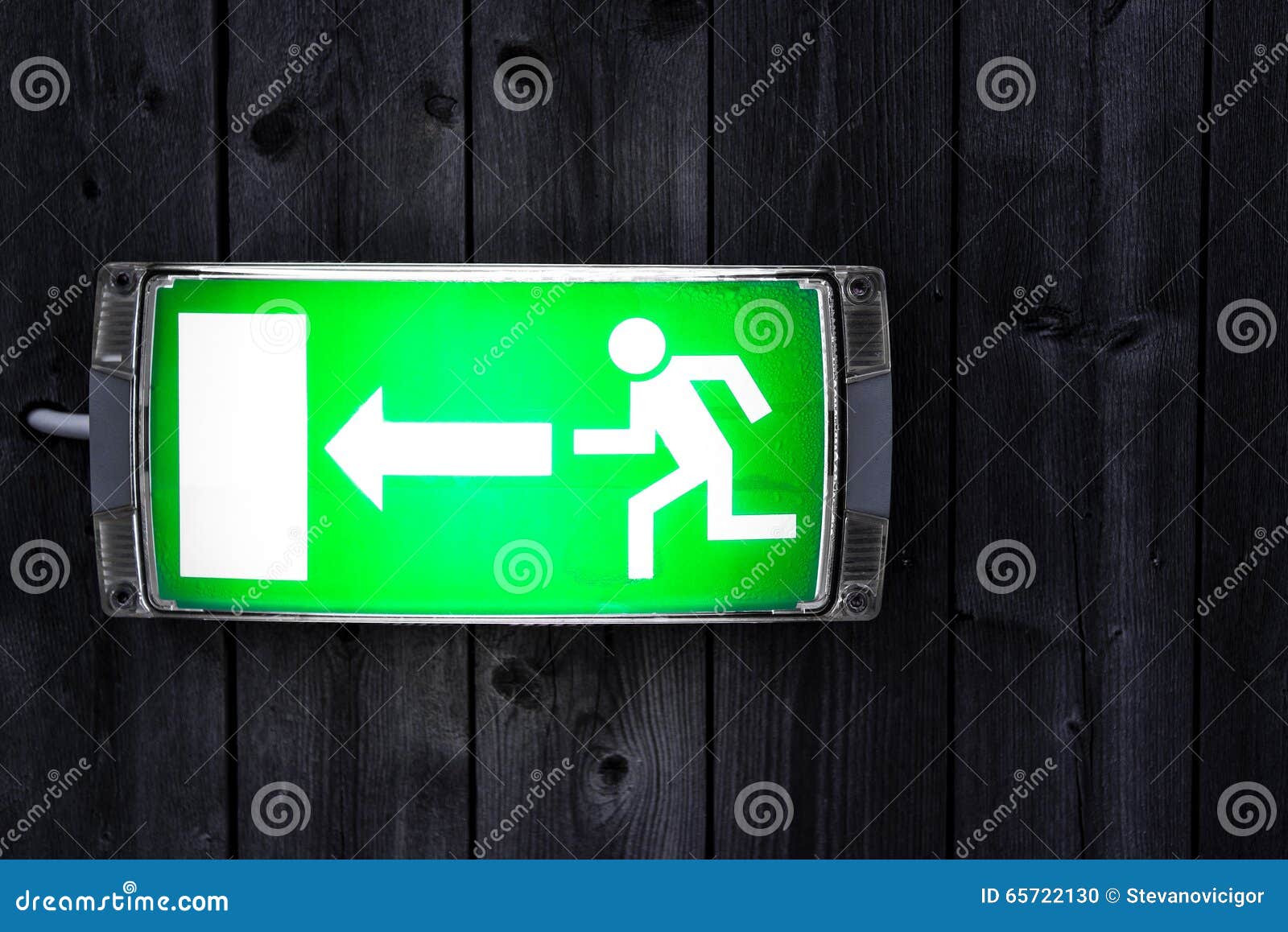 Emergency exit sign stock photo. Image of rescue, green - 65722130