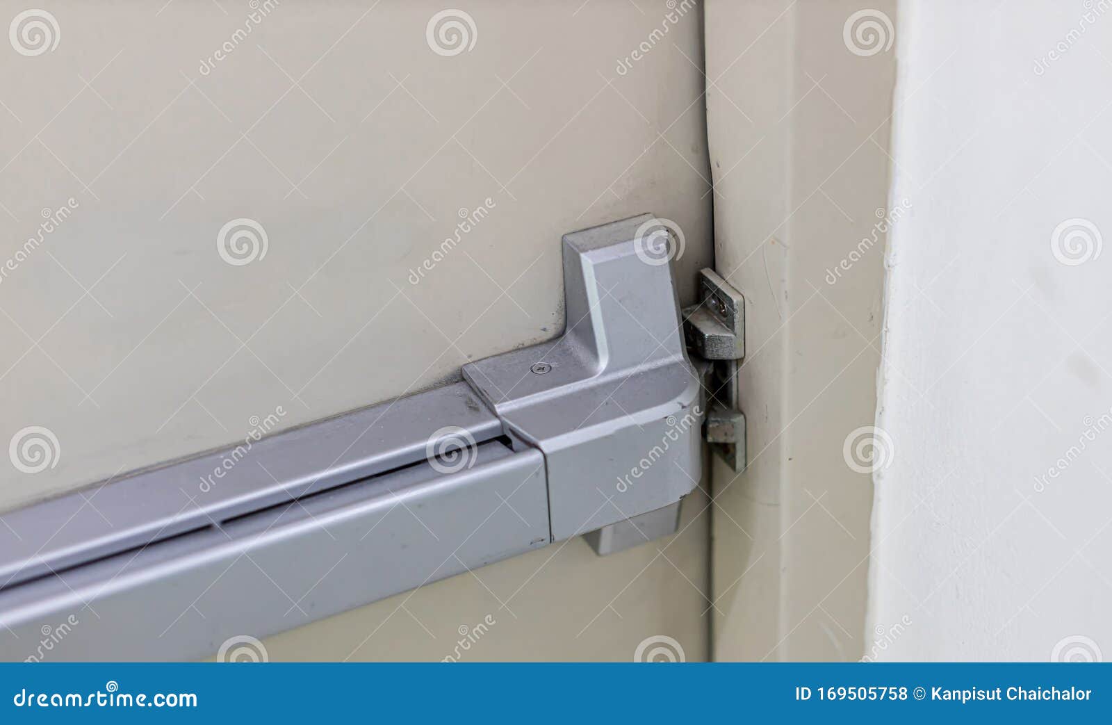 Emergency Fire Exit Door. Closed Up Latch And Rusty Door Handle Of ...