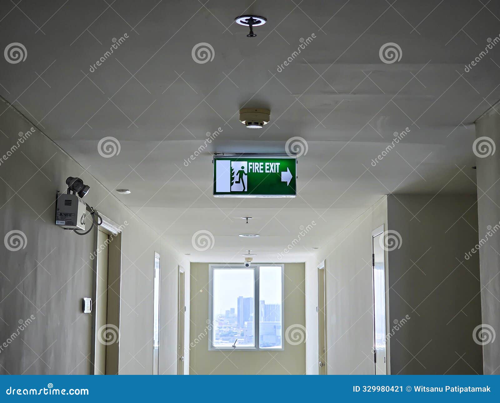 Emergency Fire Exit Sign in the Building Stock Image - Image of ...