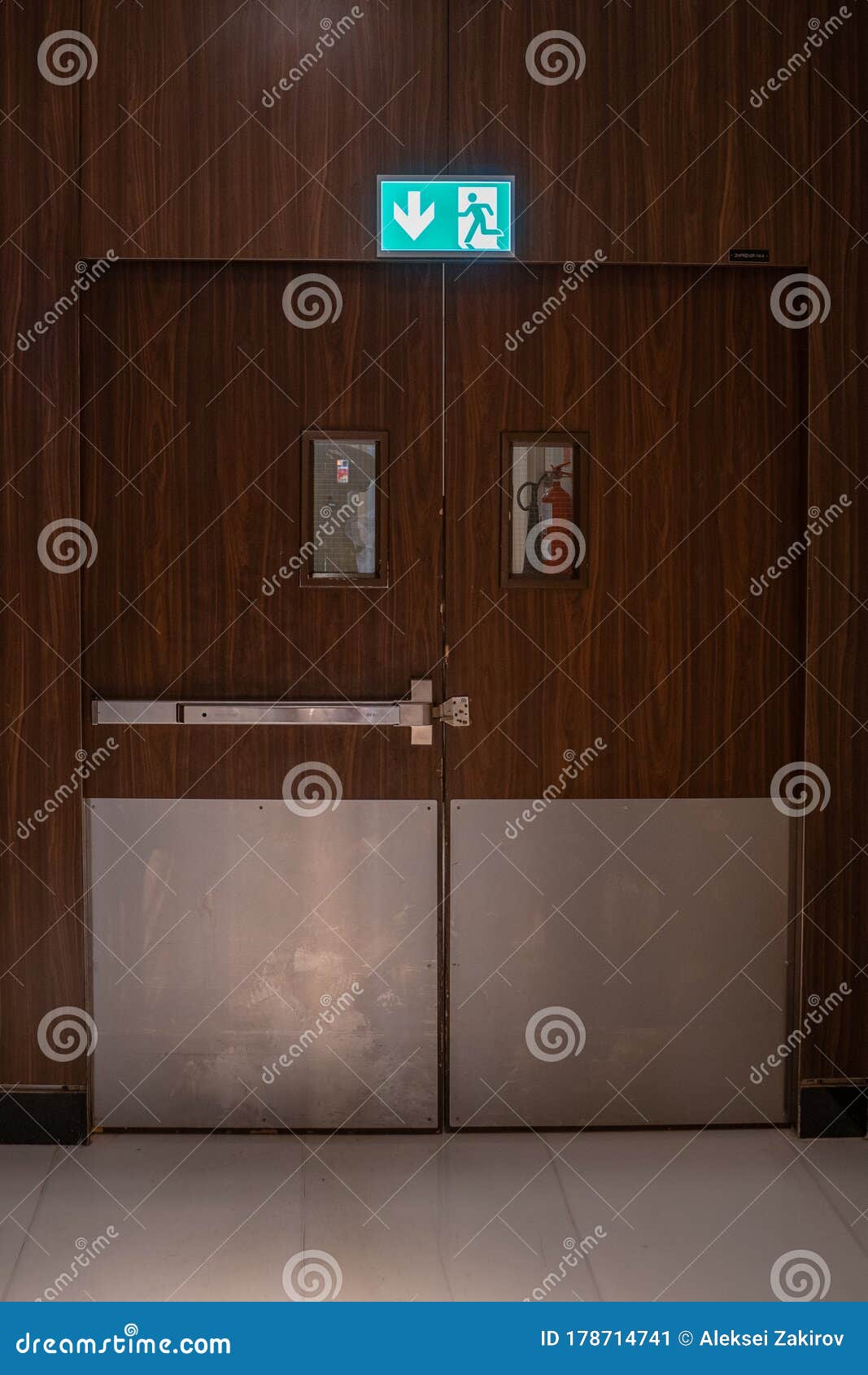 Emergency Fire Exit Sign at the Corridor in Building Stock Image ...