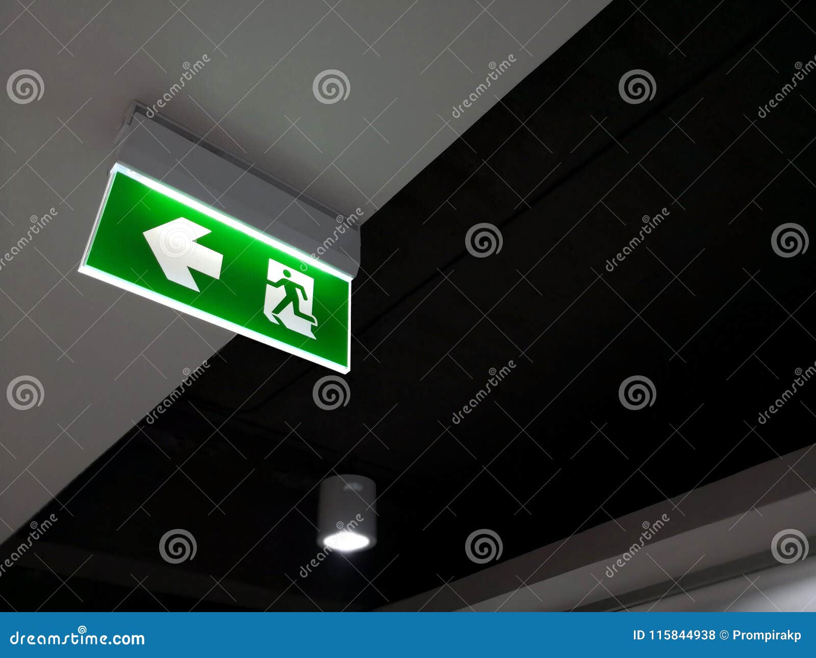 Emergency Fire Exit Sign Show the Way To Escape Stock Photo - Image of ...