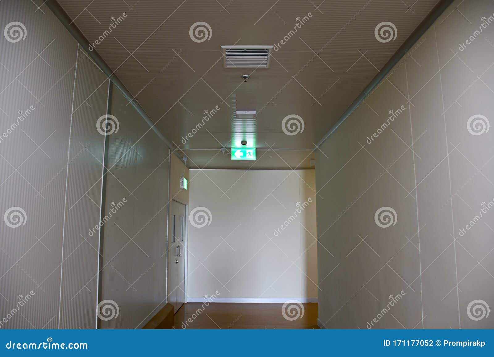 Emergency Fire Exit Sign Show the Way To Escape Stock Photo - Image of ...
