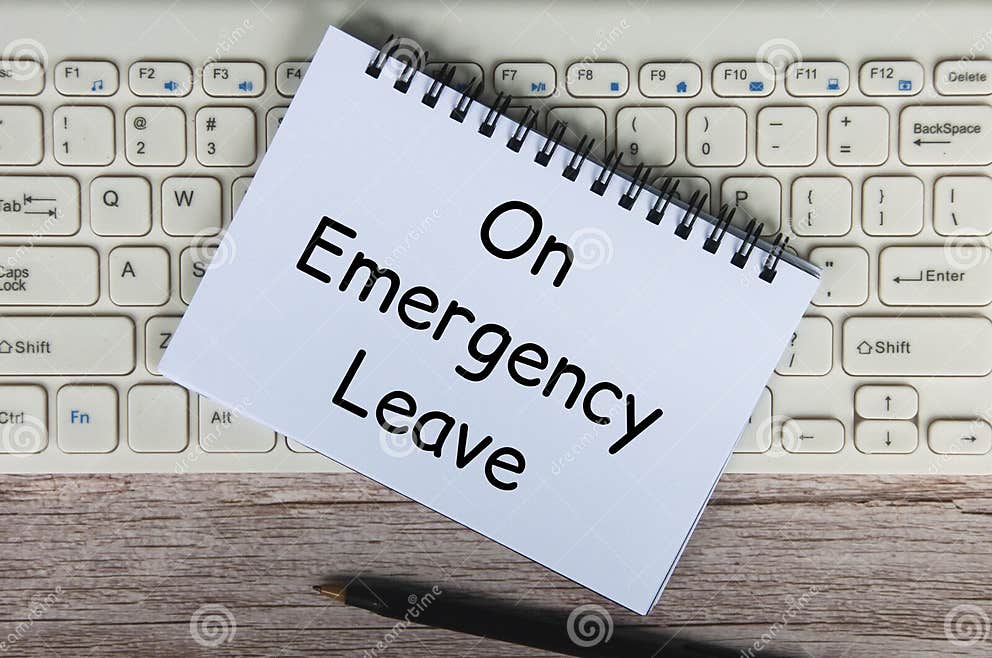 On Emergency Leave Text on White Notepad with Pen and Keyboard ...