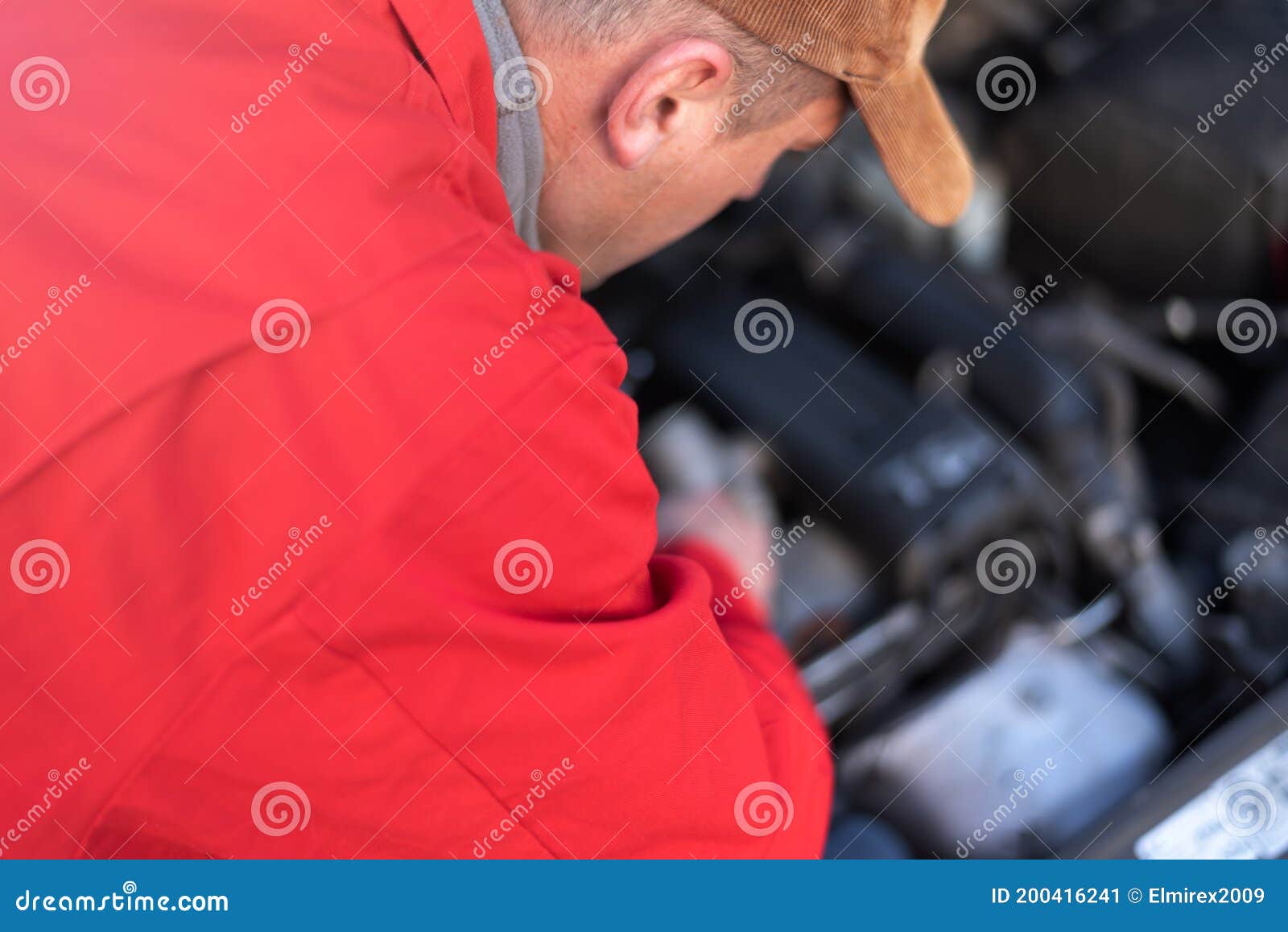 Emergency Roadside Assistance, Road Assistance Worker in Uniform Trying ...
