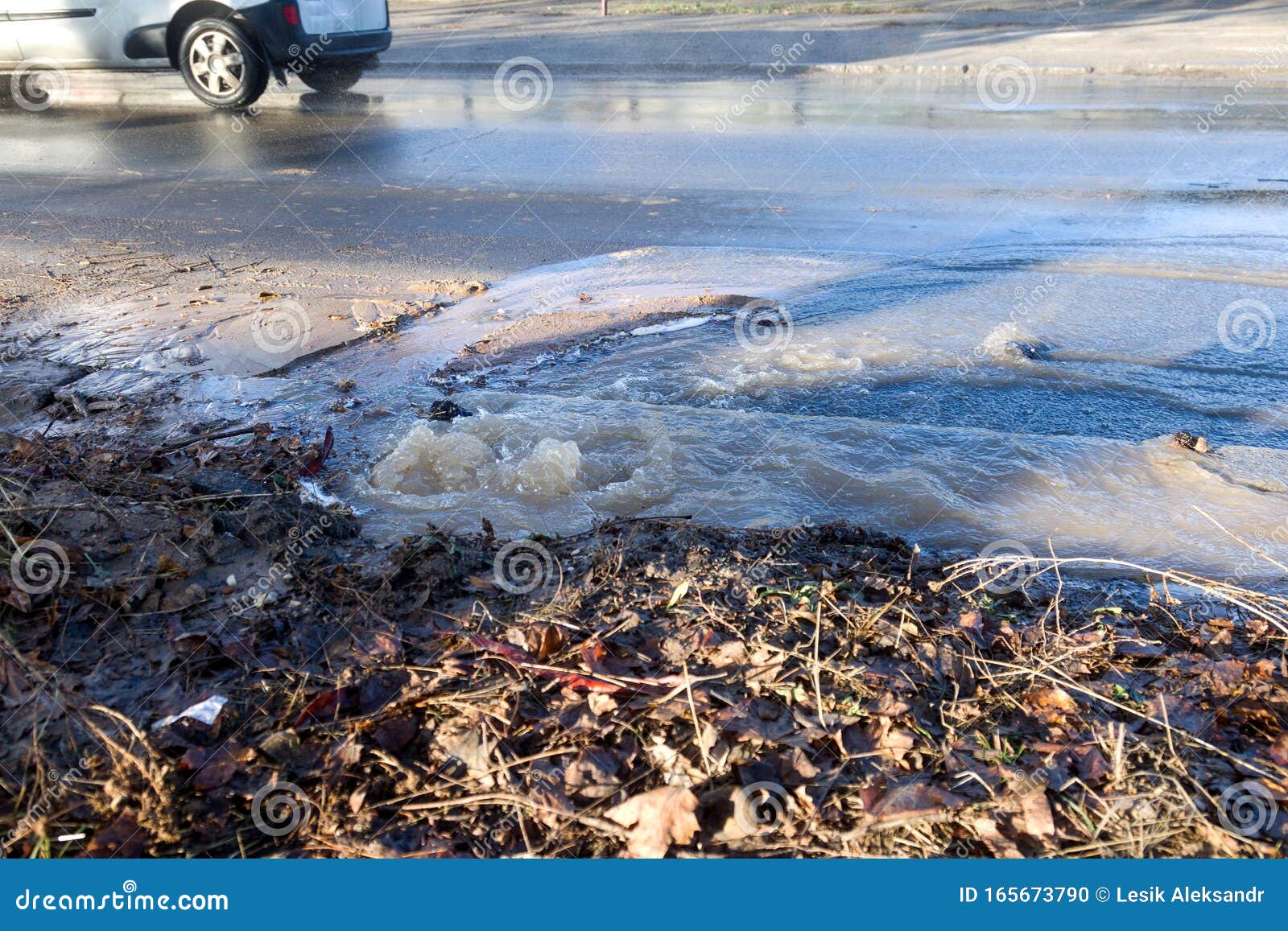 Emergency Sewerage. Water Flows Down The Sidewalk From A Ruptured ...