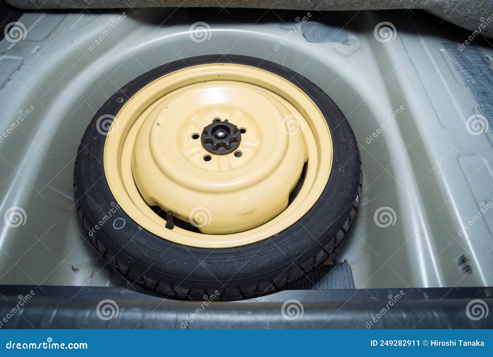 Emergency tire stock image. Image of trunk, storage - 249282911