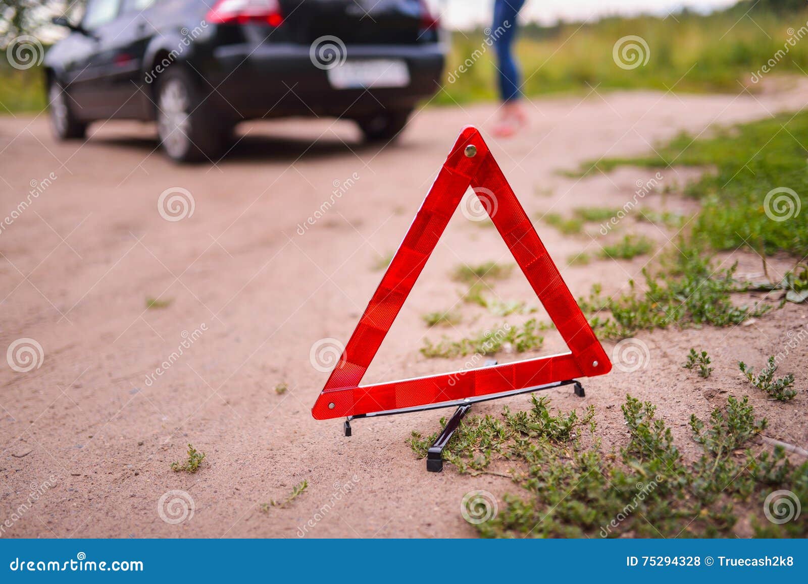 Emergency Triangle Stop Sign on the Road. Stopped Car a in the ...