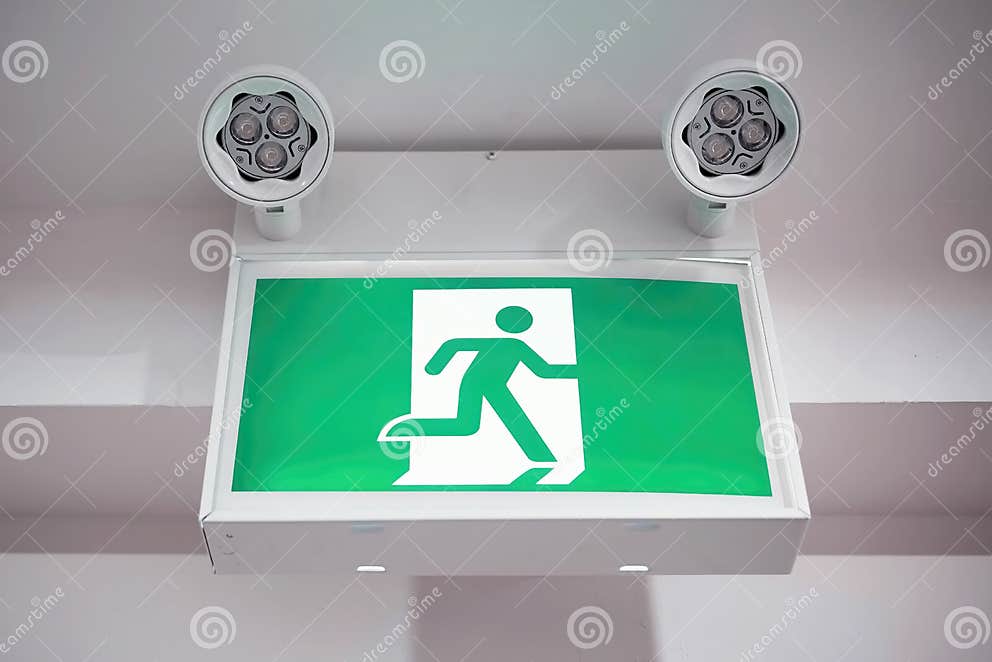 Emergency Exit Sign and Security Cameras Stock Image - Image of exit ...