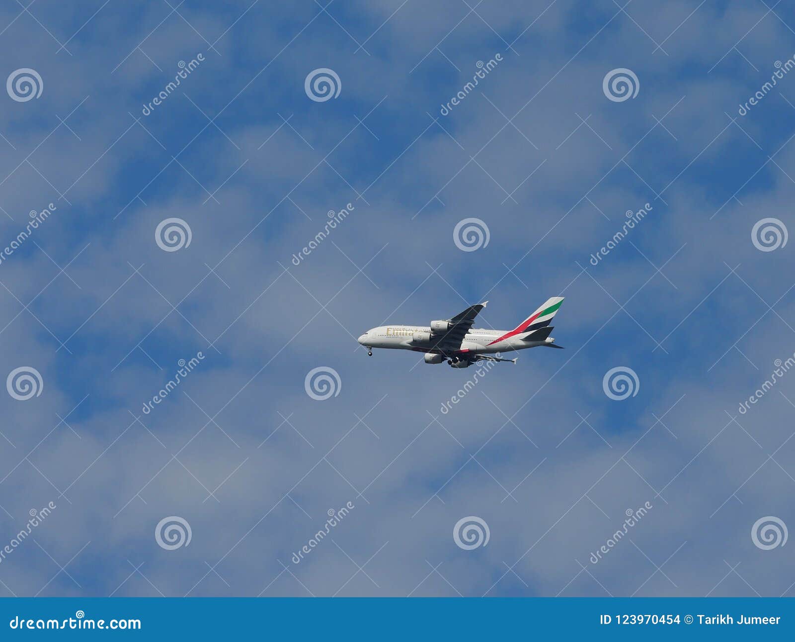 Emirates Boeing Flying in Cloudy Blue Sky Editorial Stock Image - Image ...