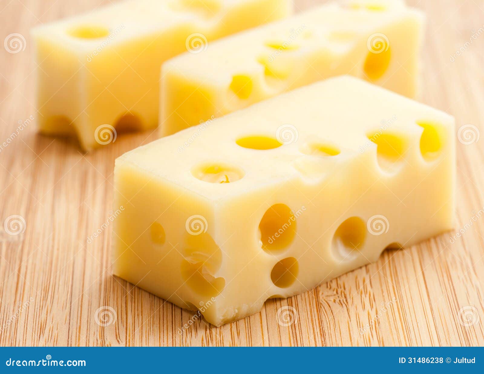 Emmental cheese stock photo. Image of pieces, wooden - 31486238
