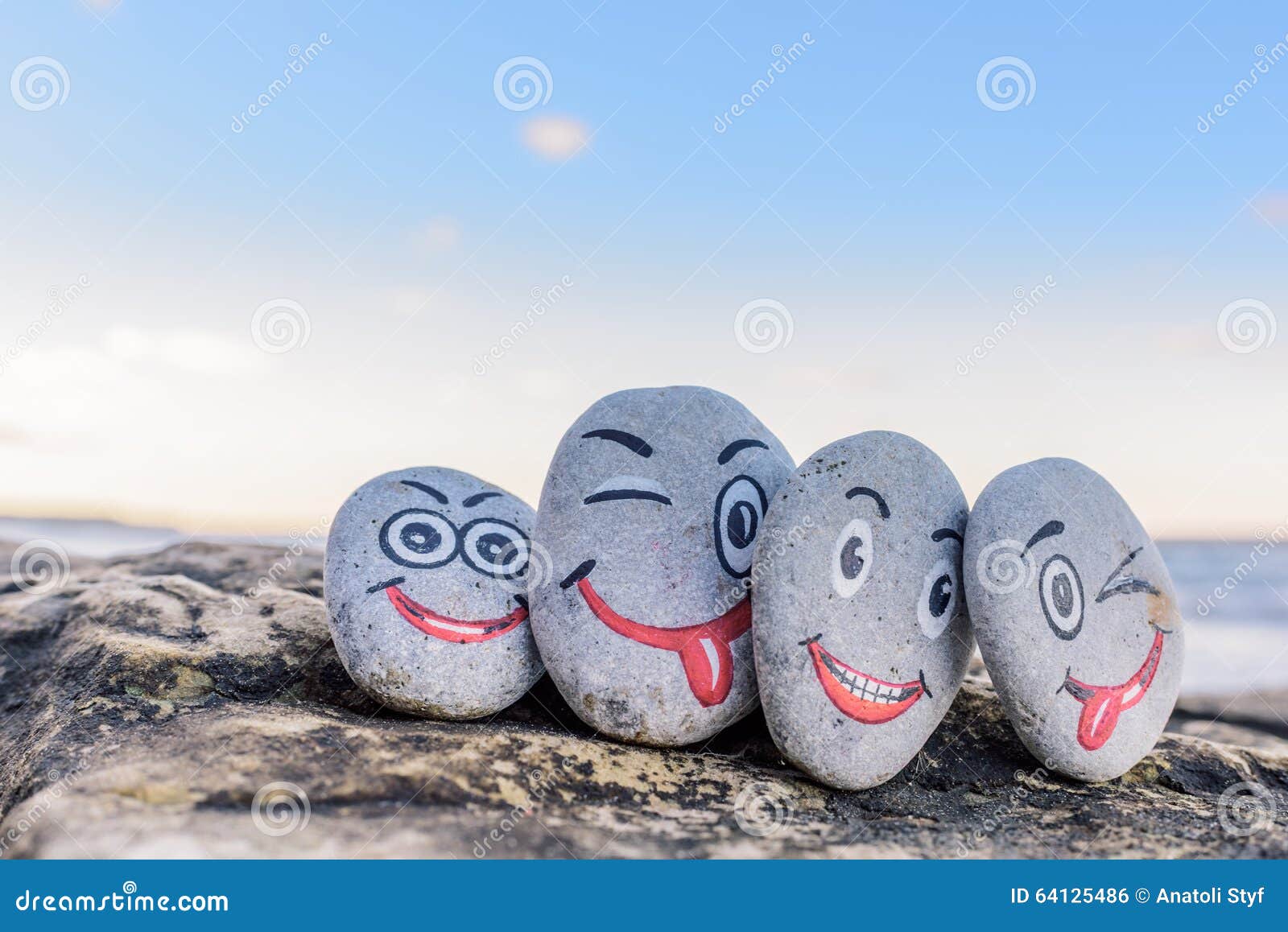 Emoticons on pebbles stock photo. Image of cute, emoticon - 64125486