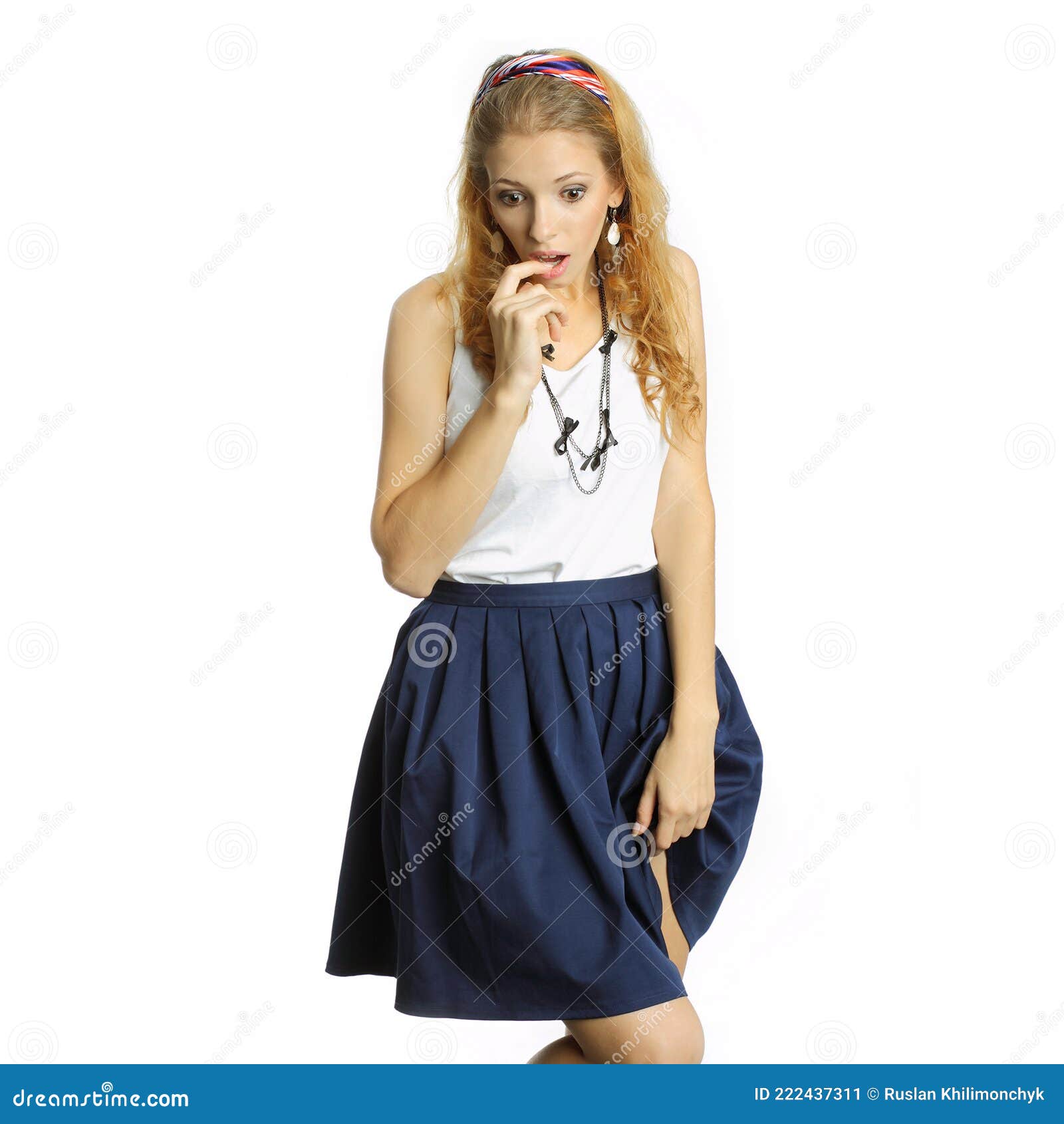 Emotional Excited Girl Looking Down And Greatly Surprised Stock Image