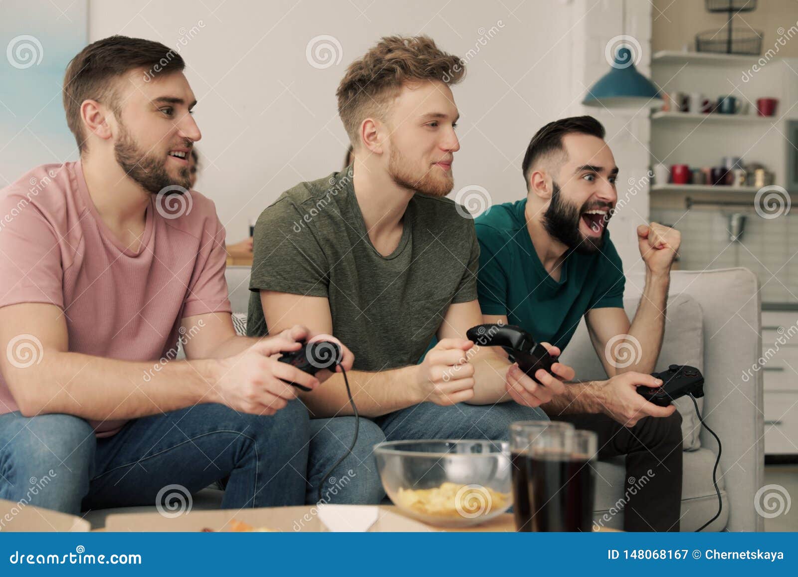 Emotional Friends Playing Video Games Stock Image - Image of living ...