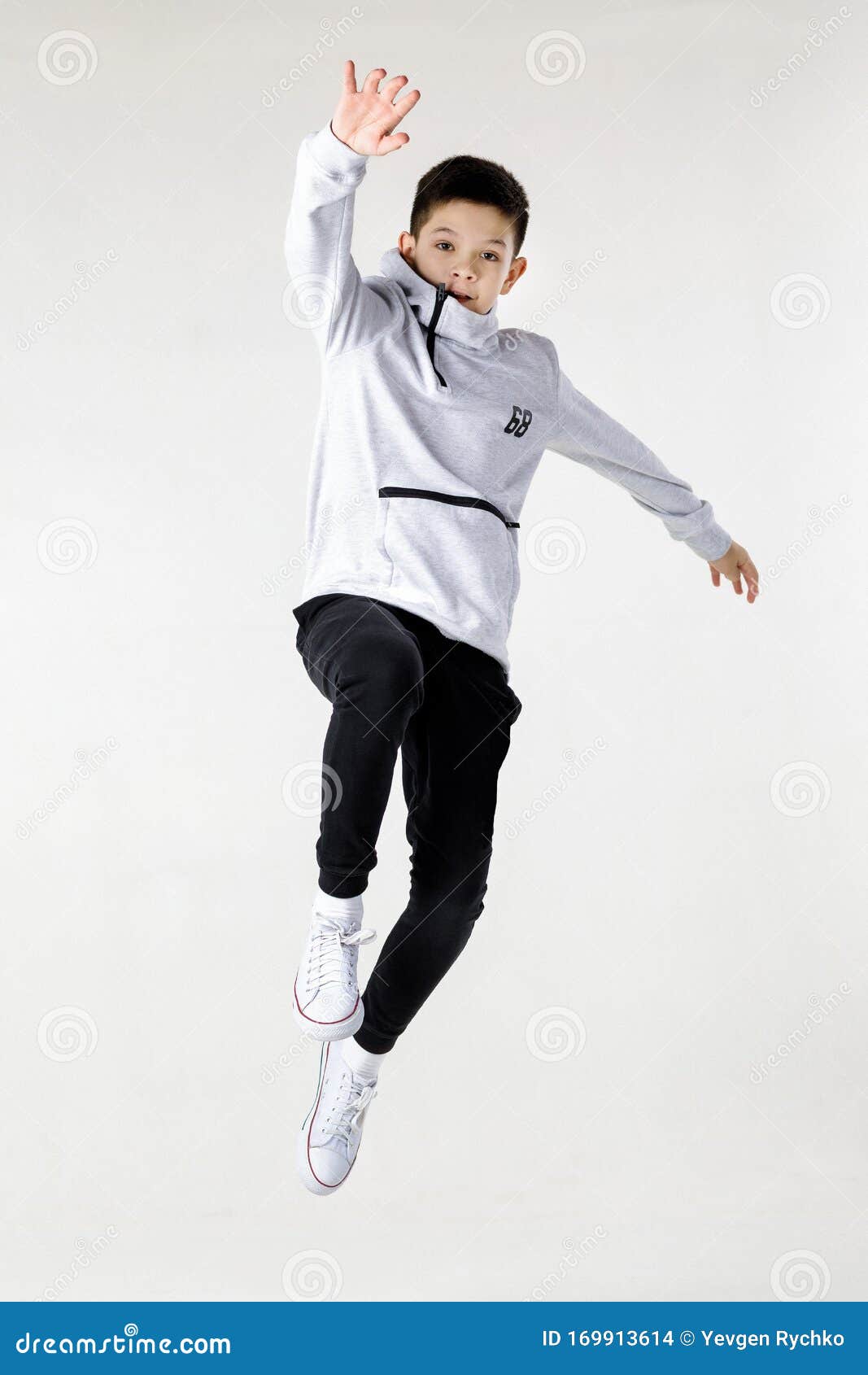 Little boy jumping stock photo. Image of background - 169913614
