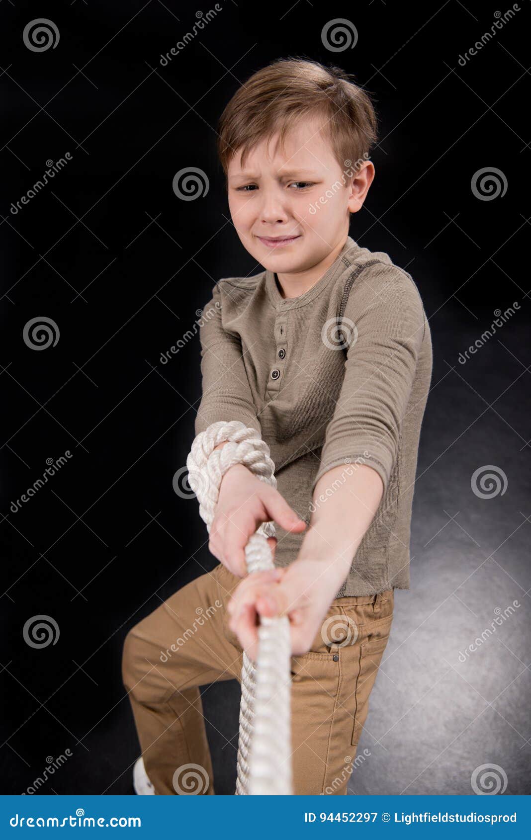Emotional Little Boy Pulling Rope Stock Image - Image of rope, hold ...