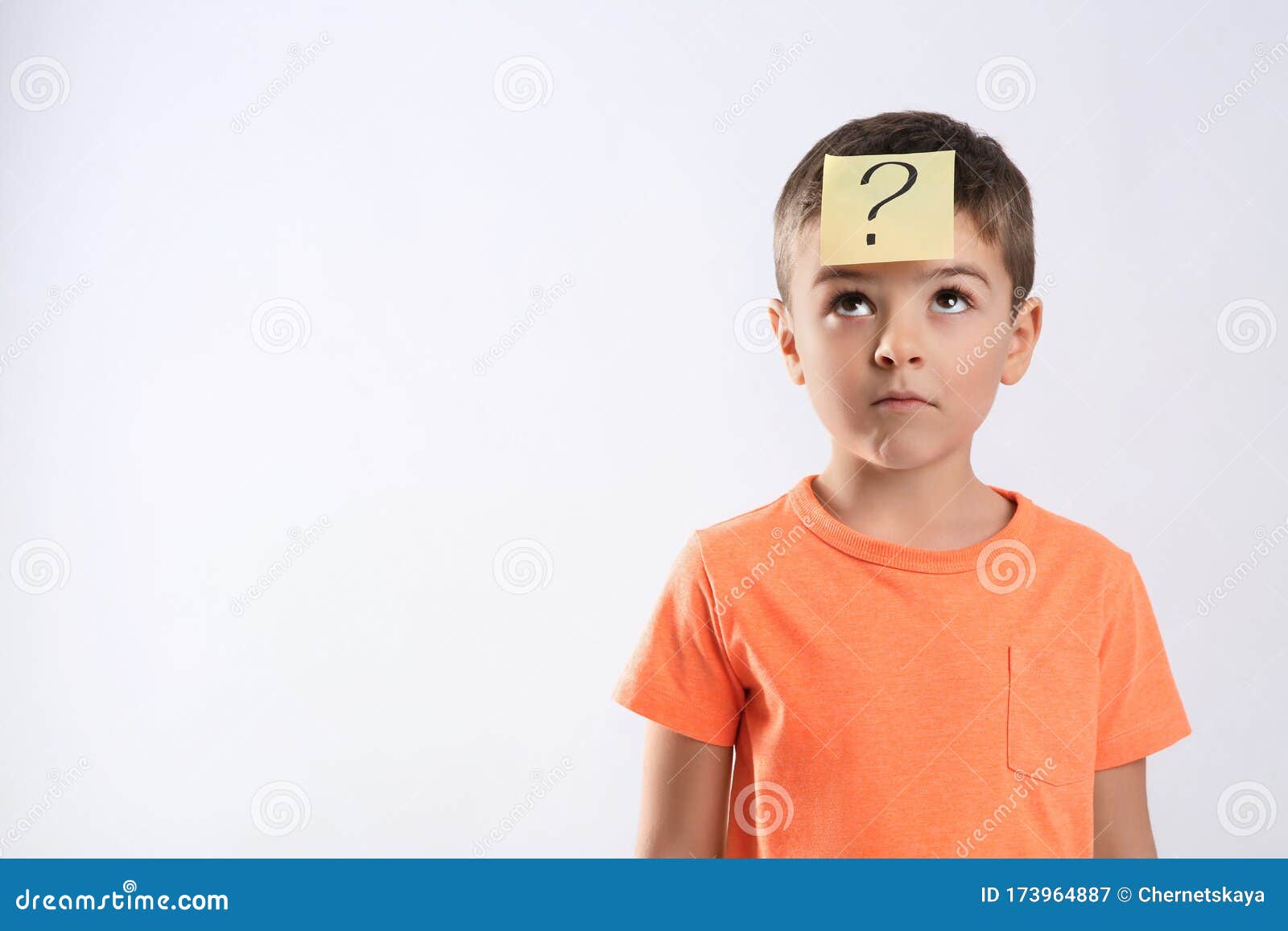 Emotional Little Boy with Question Mark on Background Stock Image ...