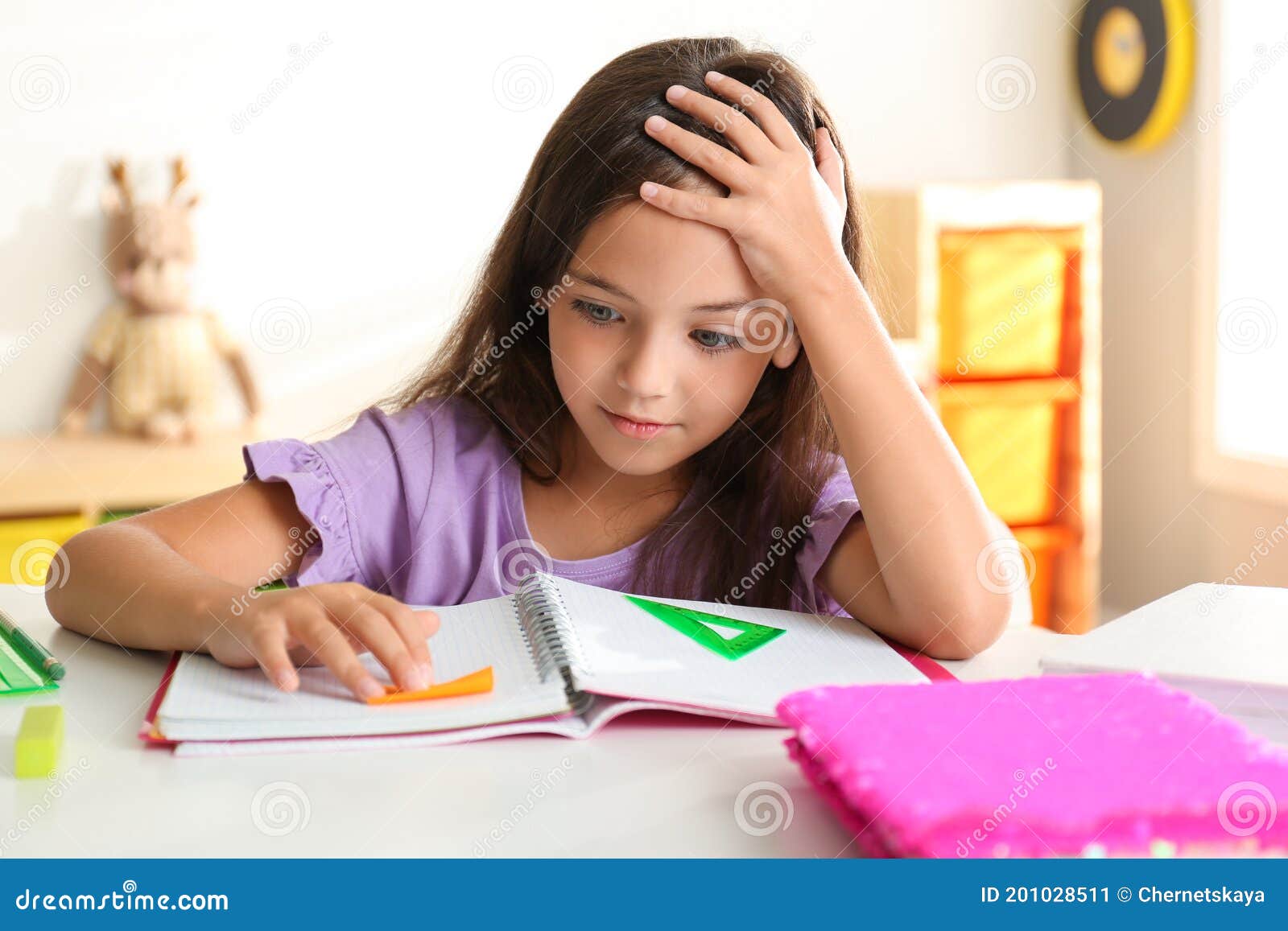 Emotional Little Girl Doing Homework at Table Indoors Stock Image ...