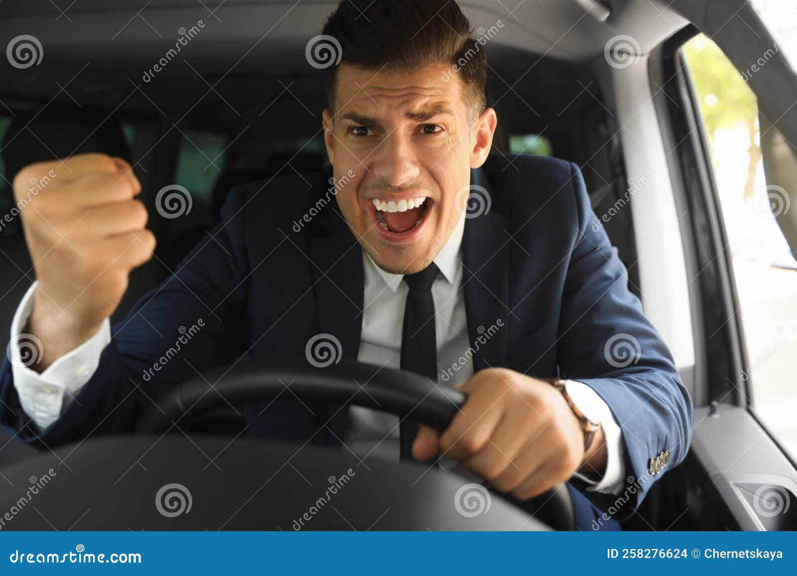 Emotional Man Yelling in Car. Aggressive Driving Behavior Stock Photo ...