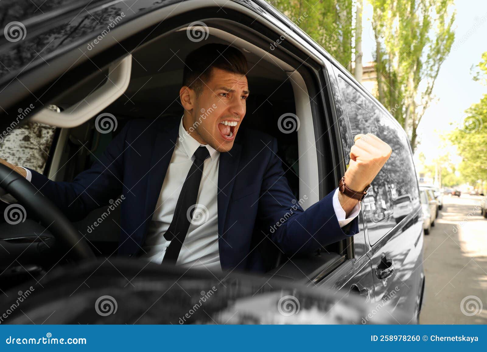 Emotional Man Yelling in Car. Aggressive Driving Behavior Stock Photo ...