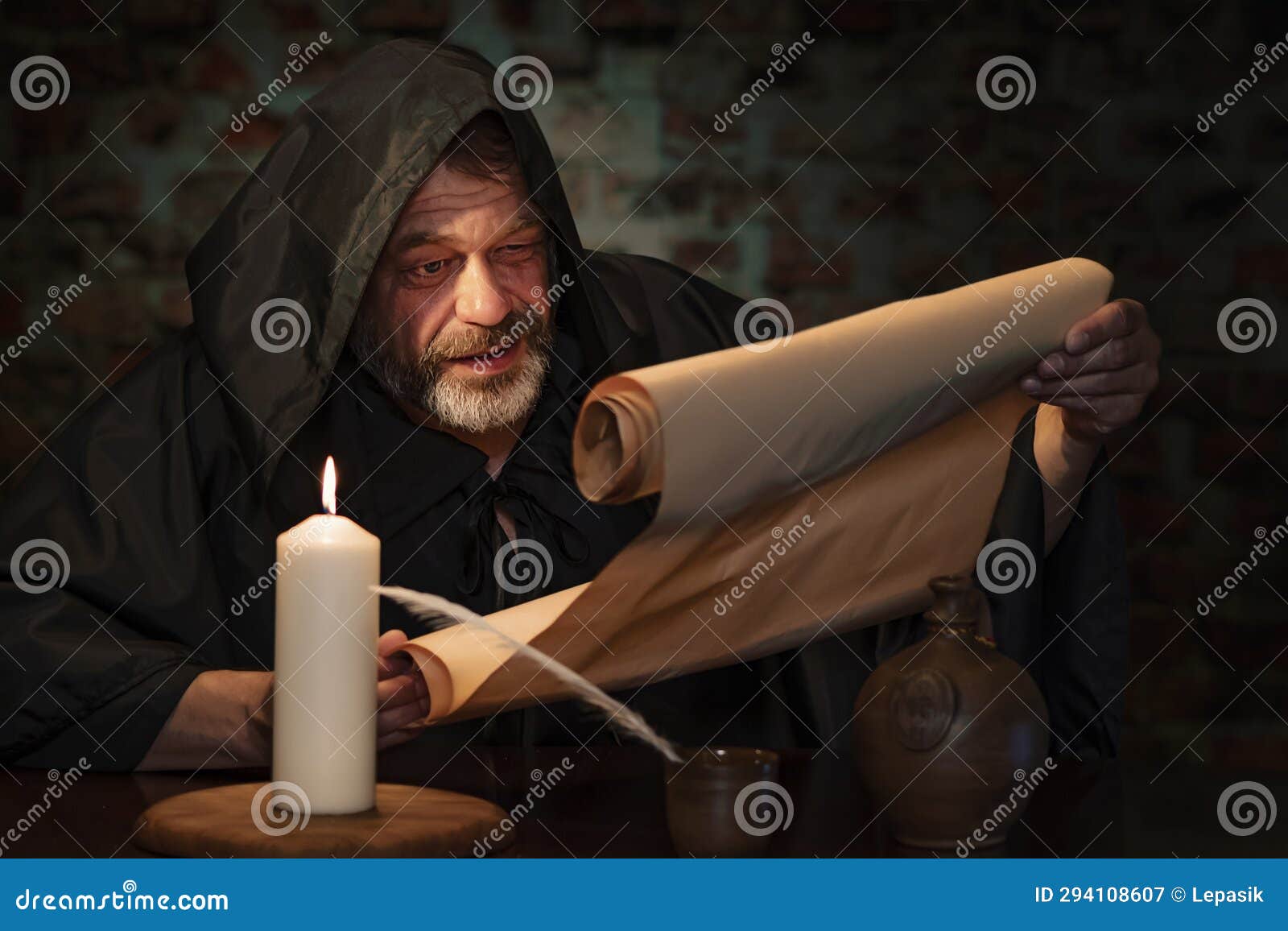 Emotional Portrait of an Elderly Monk, by Candlelight Reading a Message ...