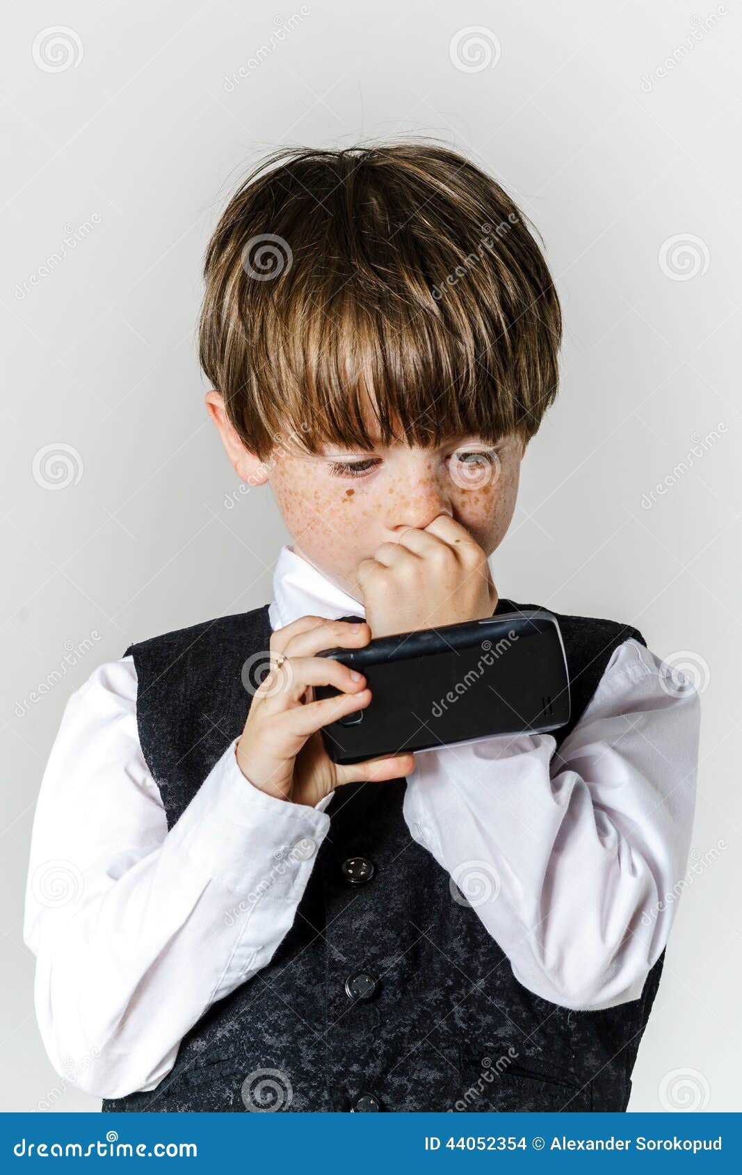 Emotional Red-haired Boy with Mobile Phone Stock Photo - Image of cell ...