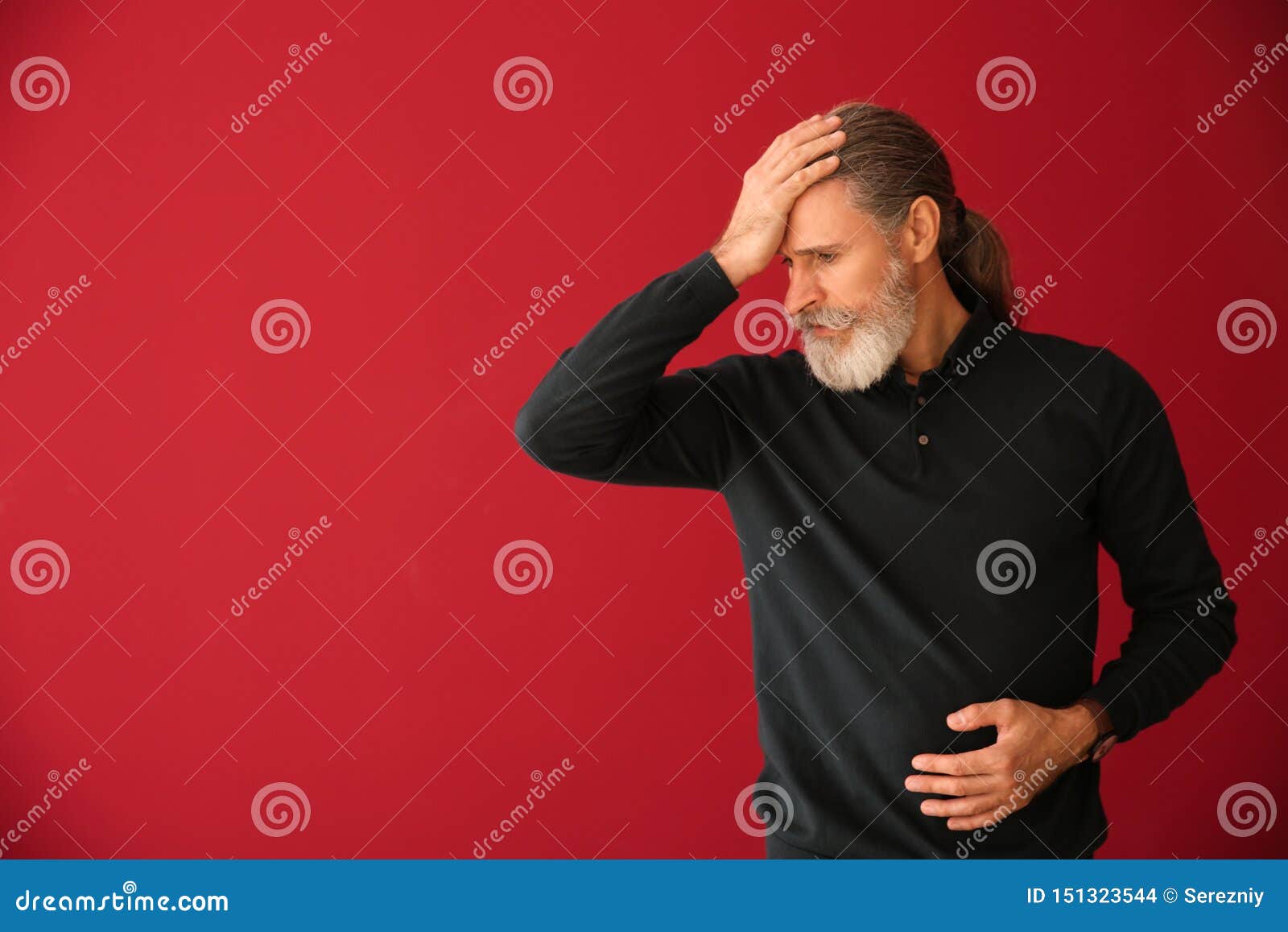 Emotional Senior Man after Making Mistake on Color Background Stock ...