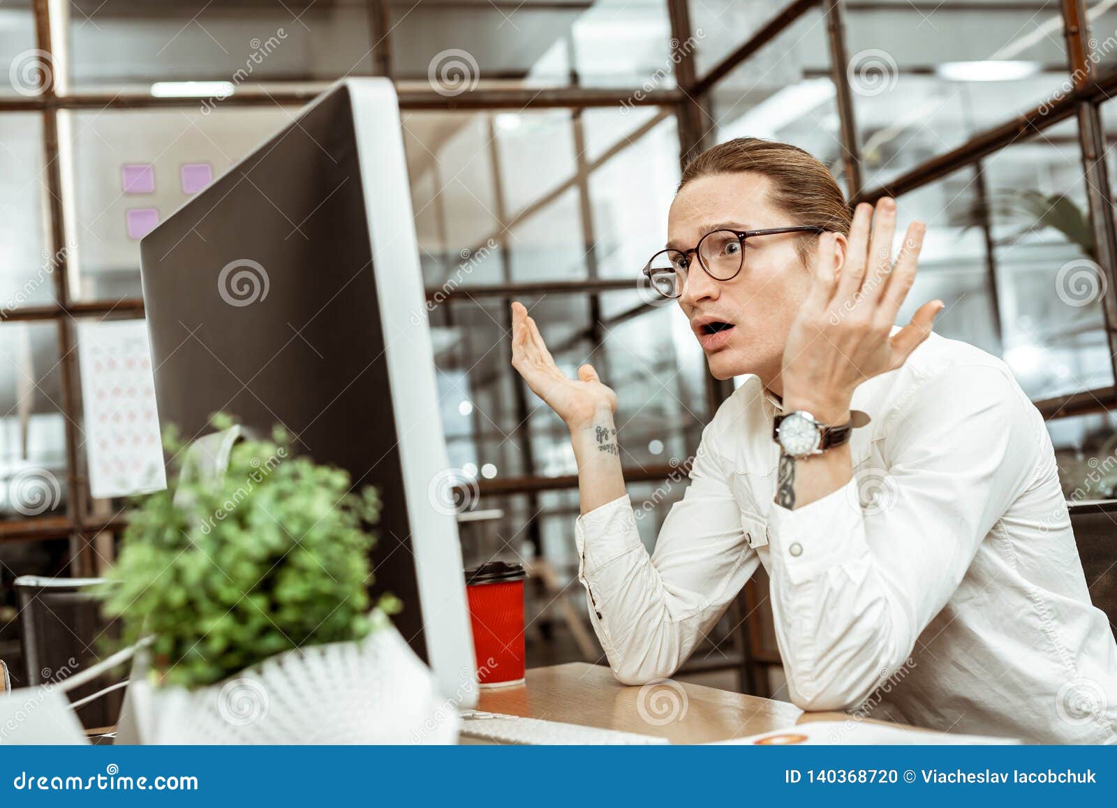 Emotional Young Man Looking at the Computer Screen Stock Photo - Image ...