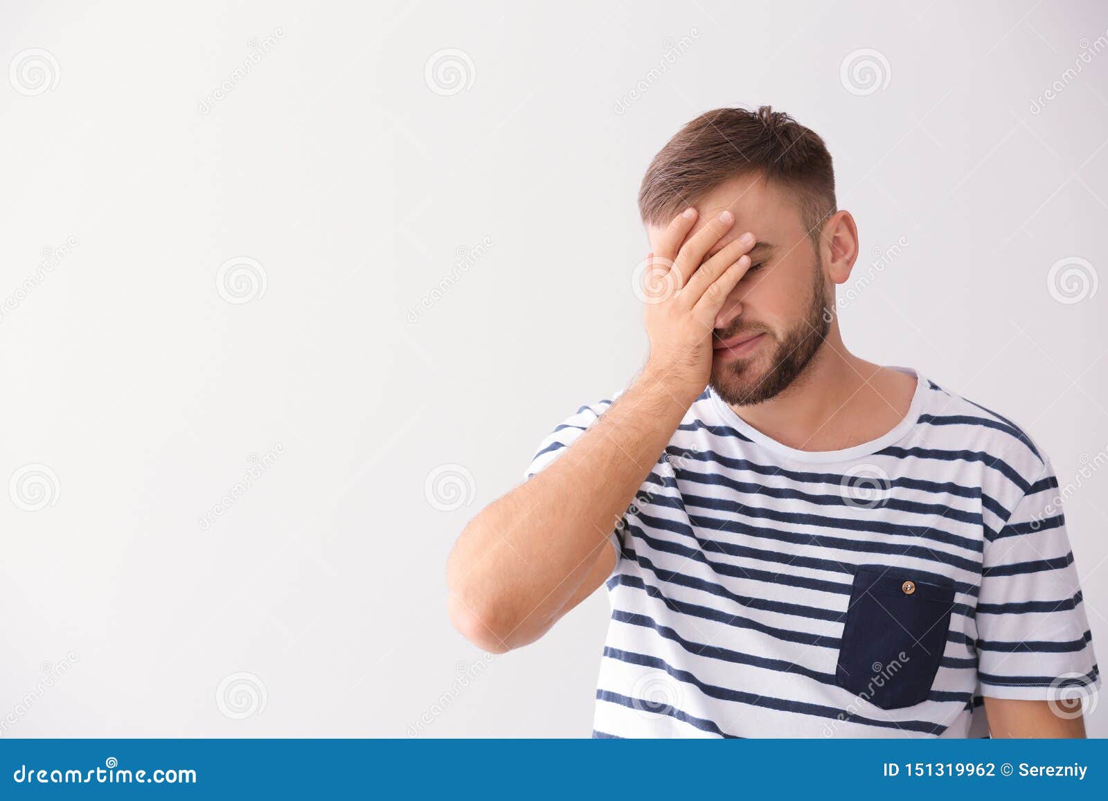 Emotional Young Man after Making Mistake on White Background Stock ...