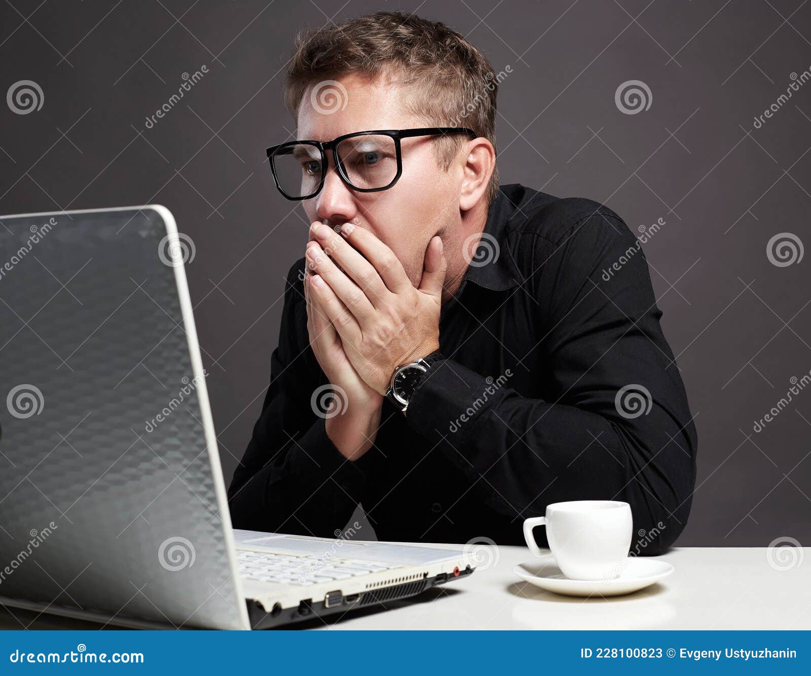 Emotions Man Sitting at a Computer. Funny Boy in Glasses Stock Image ...