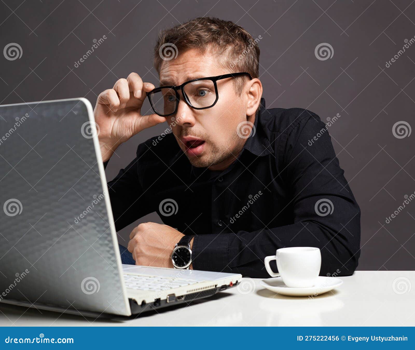 Emotions Man Sitting at a Computer. Funny Boy in Glasses Stock Photo ...