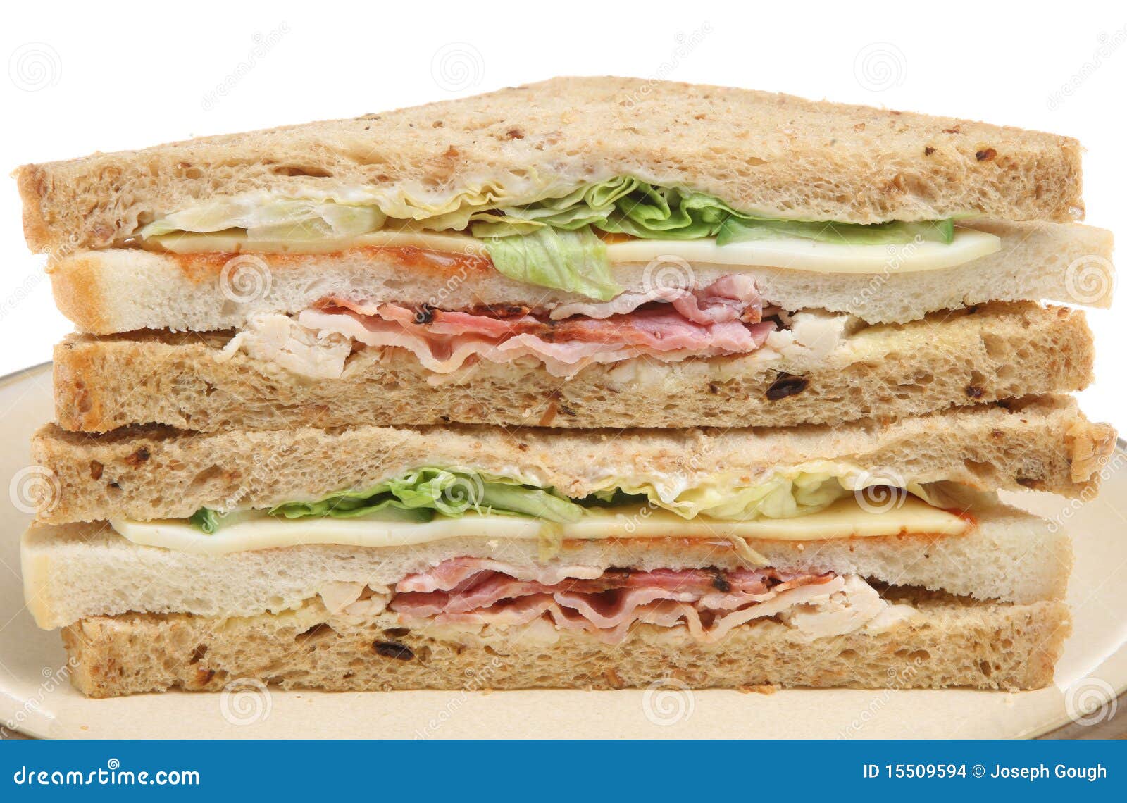 Emparedado Triple Con Tocino, El Pollo Y El Queso Foto de archivo ...