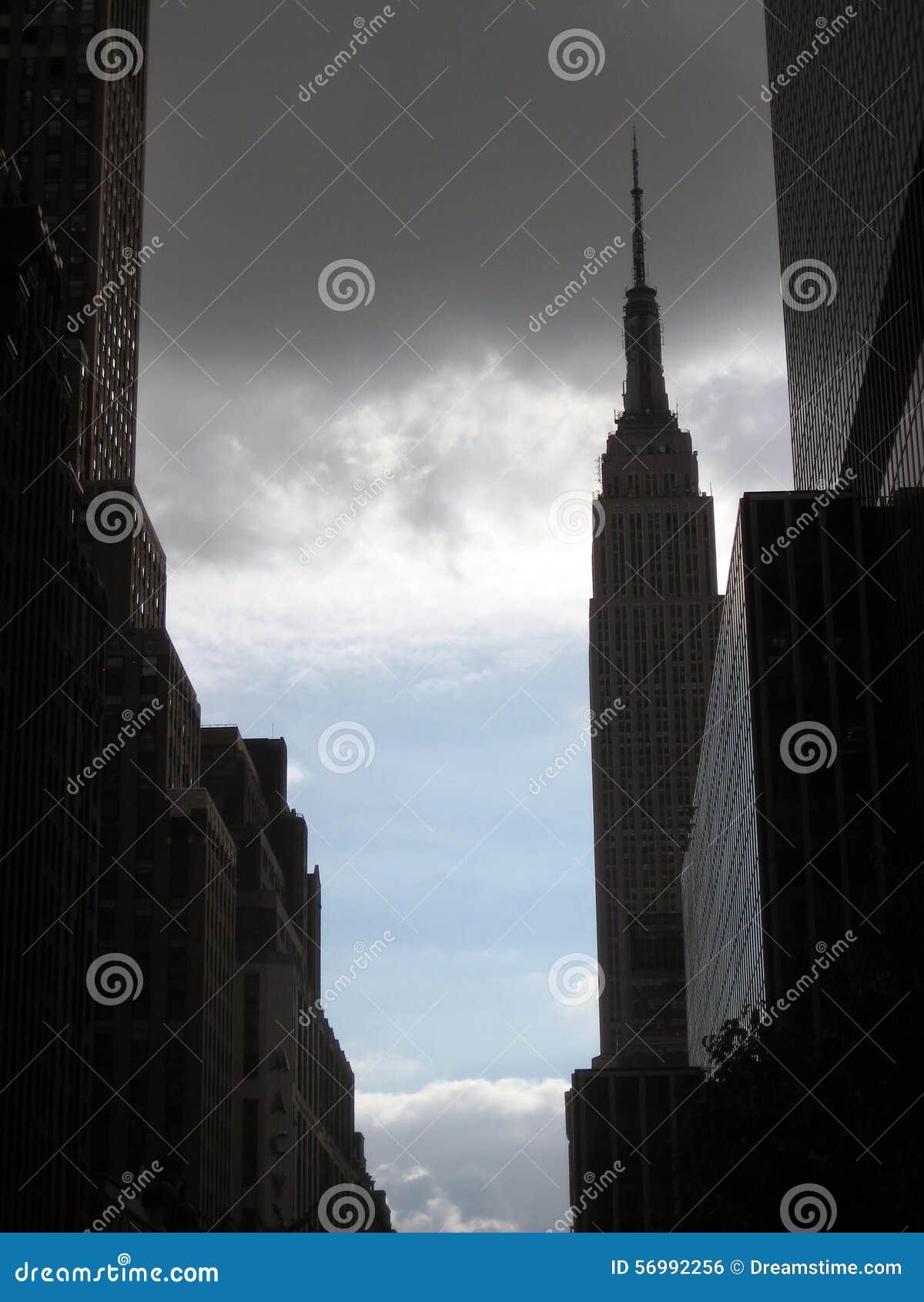 Empire State Building with Storm Clouds Editorial Photo - Image of ...