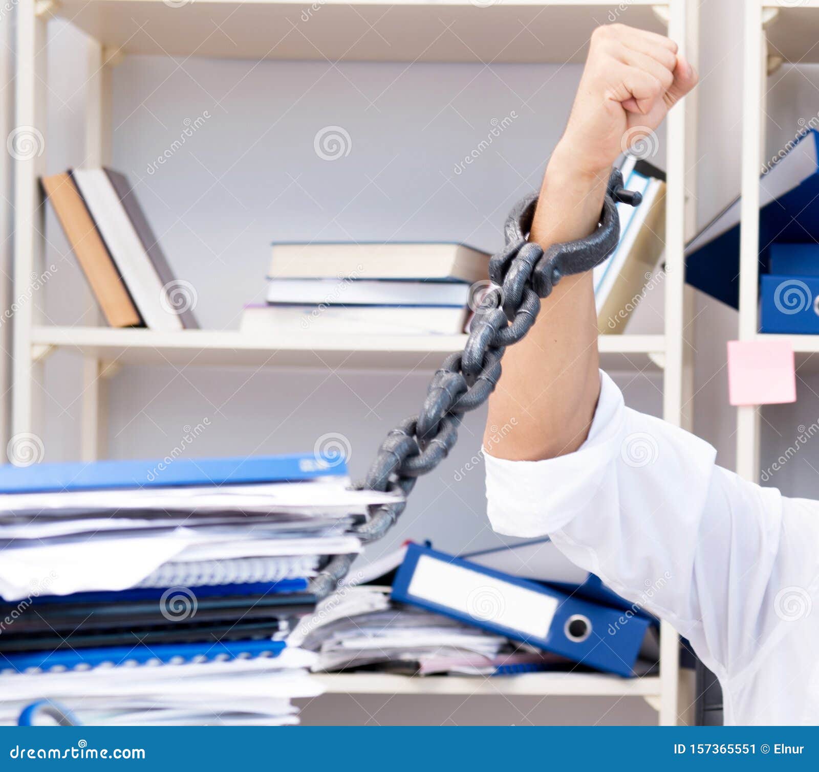 Employee Attached and Chained To His Desk with Chain Stock Image ...