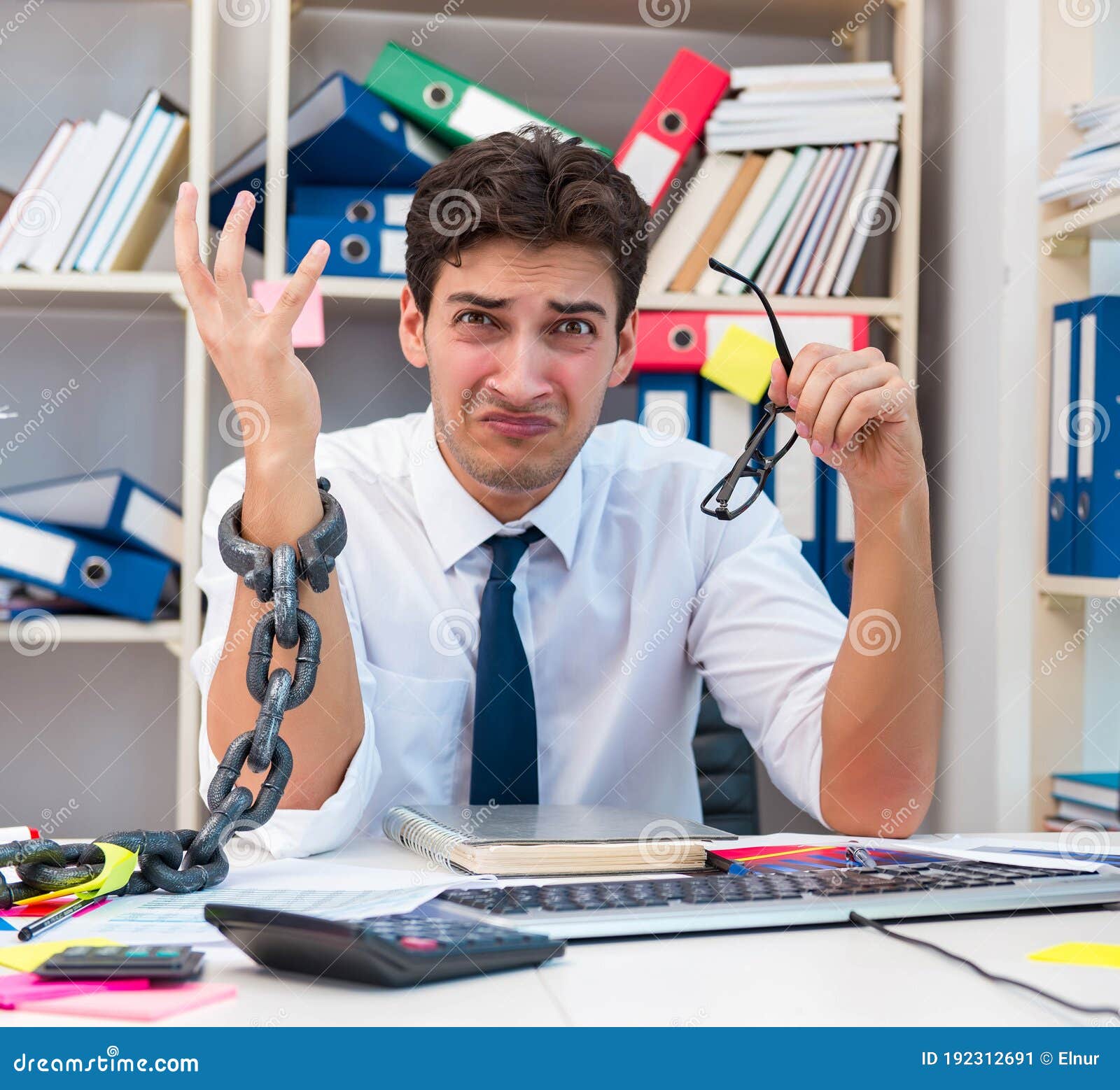 Employee Attached and Chained To His Desk with Chain Stock Image ...