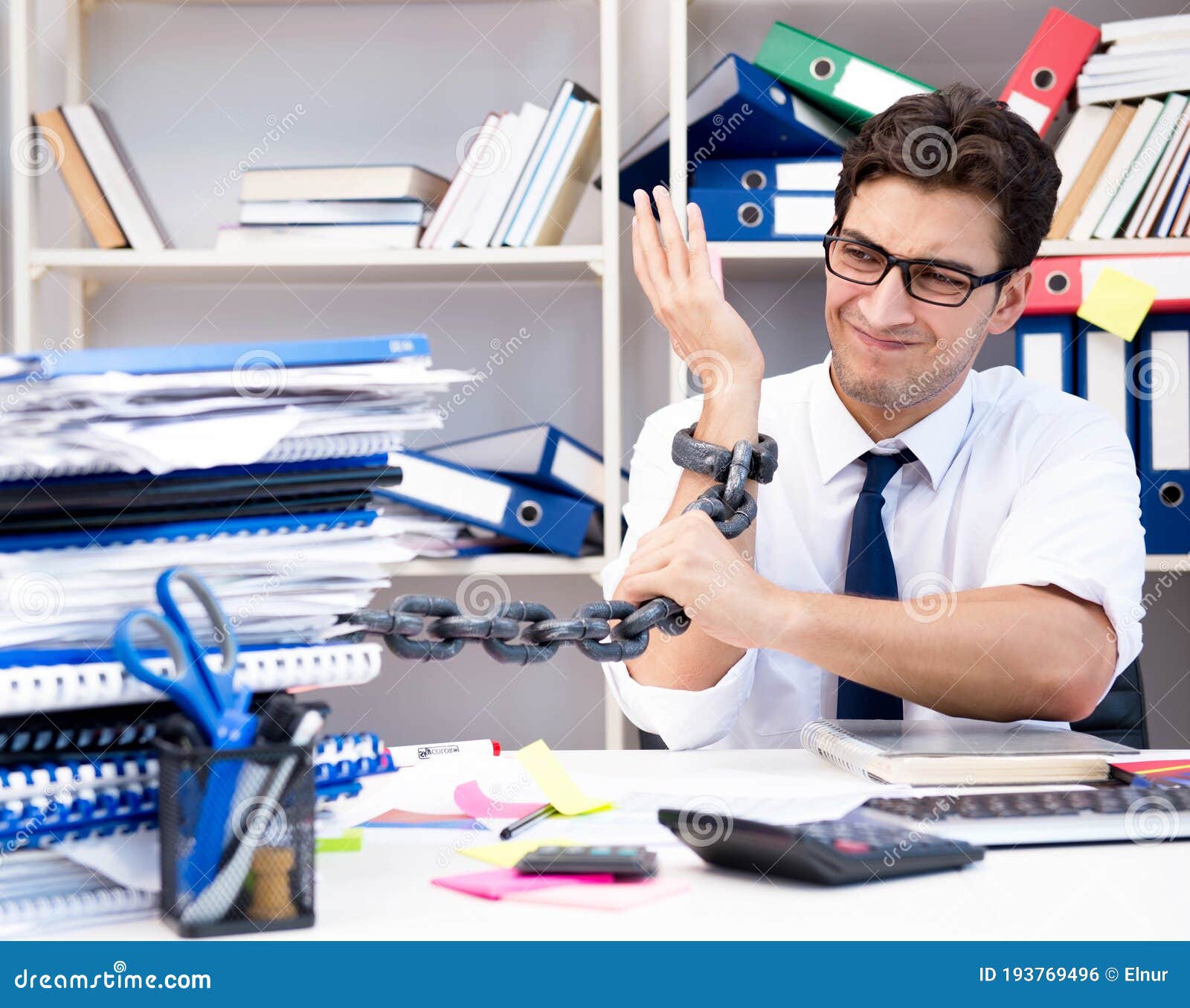 Employee Attached and Chained To His Desk with Chain Stock Photo ...