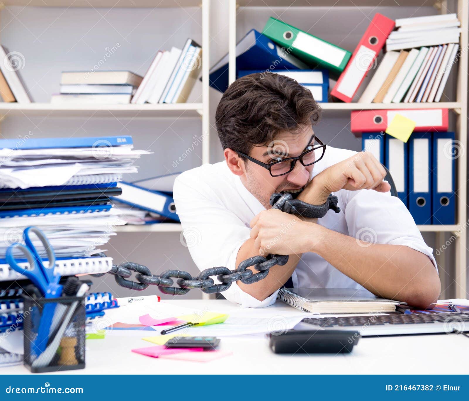 Employee Attached and Chained To His Desk with Chain Stock Photo ...