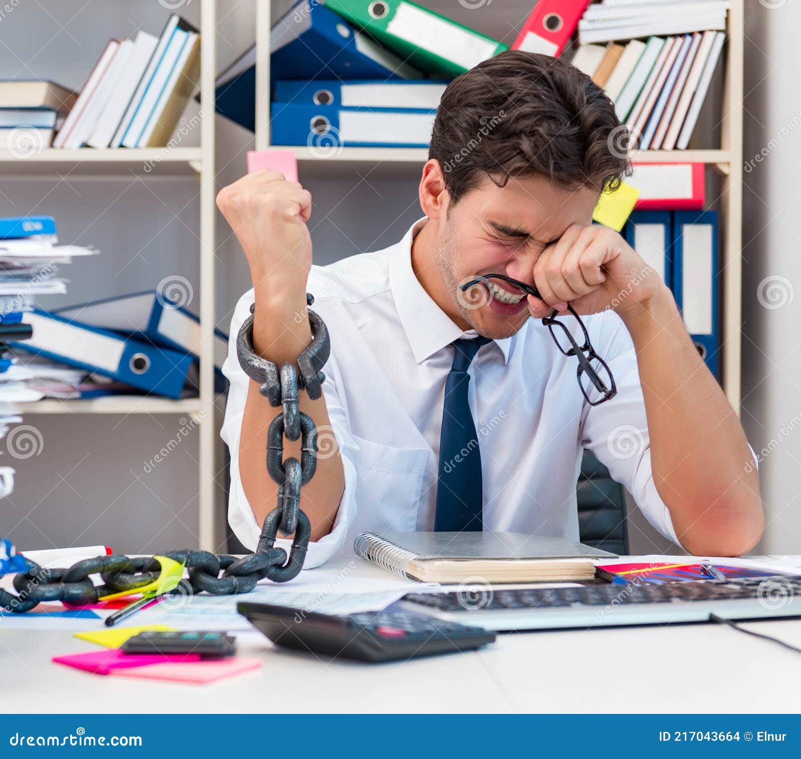 Employee Attached and Chained To His Desk with Chain Stock Photo ...