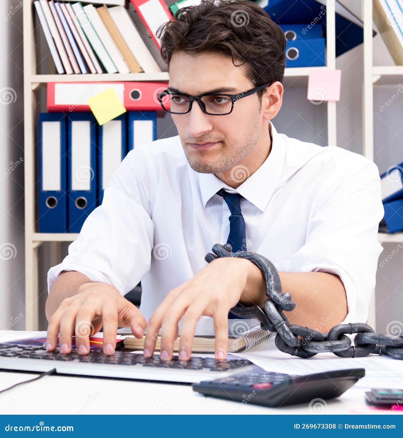 Employee Attached and Chained To His Desk with Chain Stock Photo ...