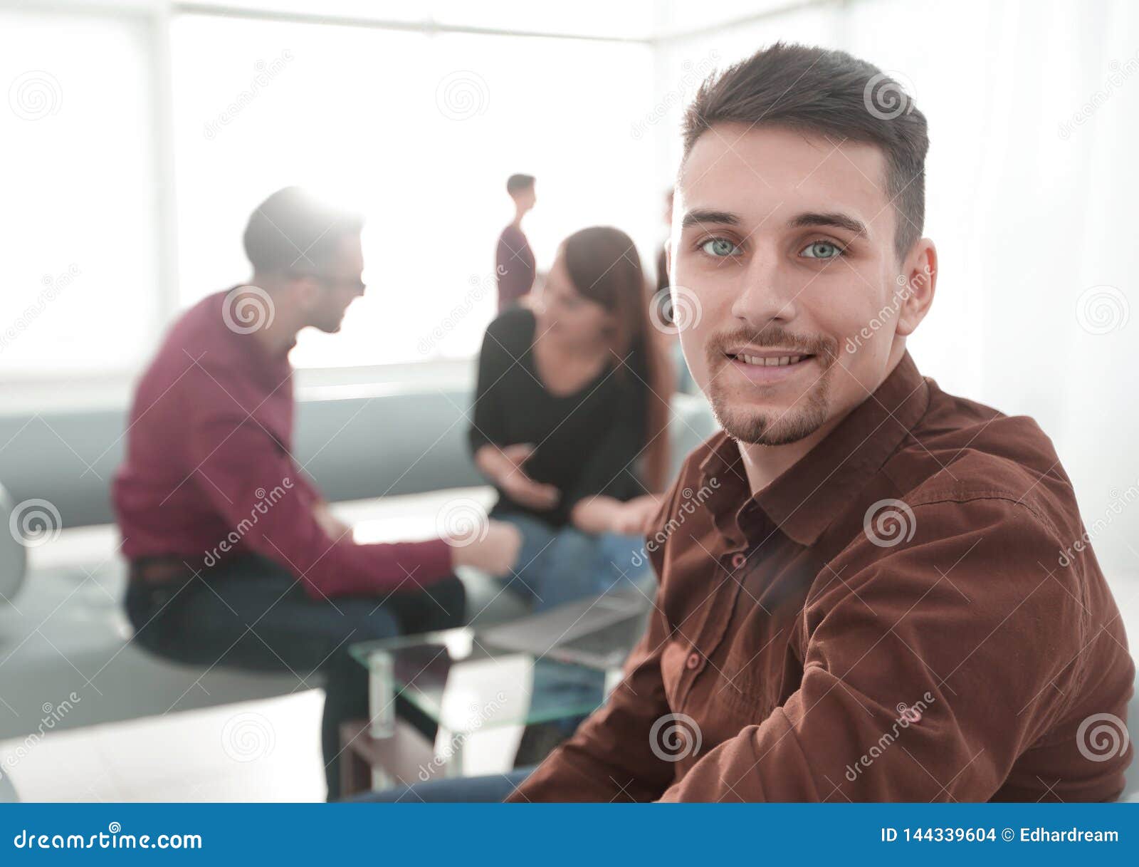 Employee on the Background of Business Team Stock Photo - Image of ...