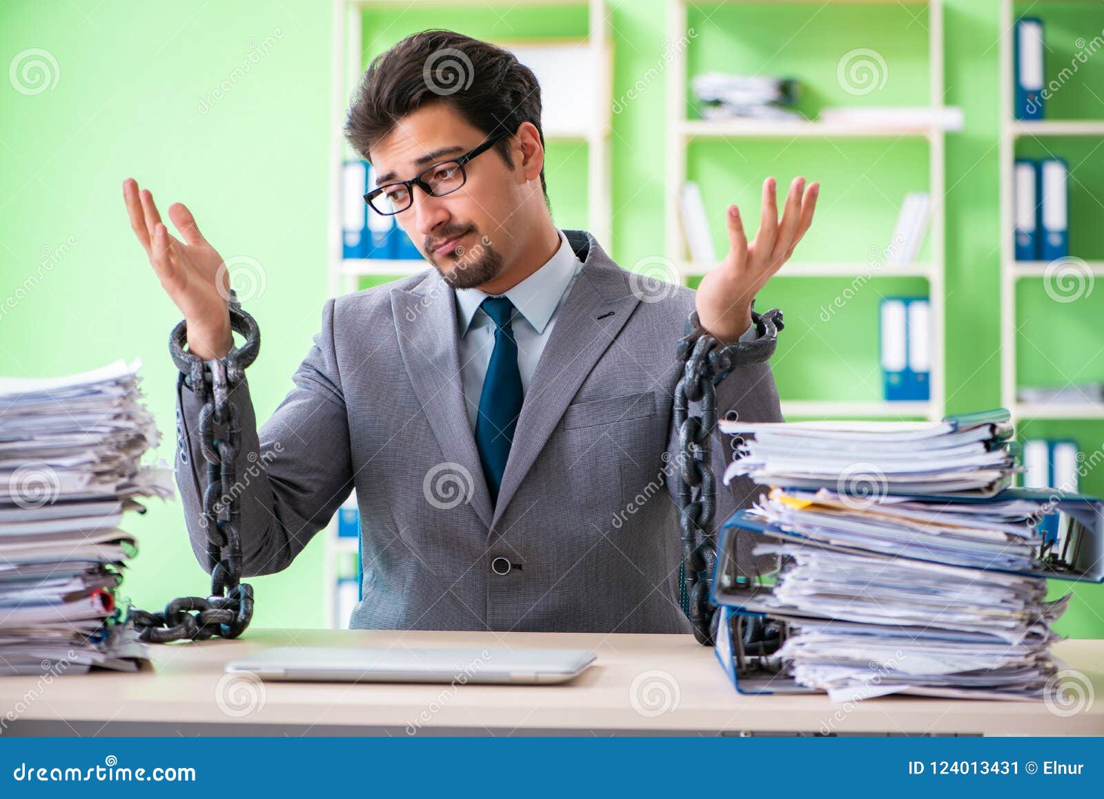 The Employee Chained To His Desk Due To Workload Stock Image - Image of ...