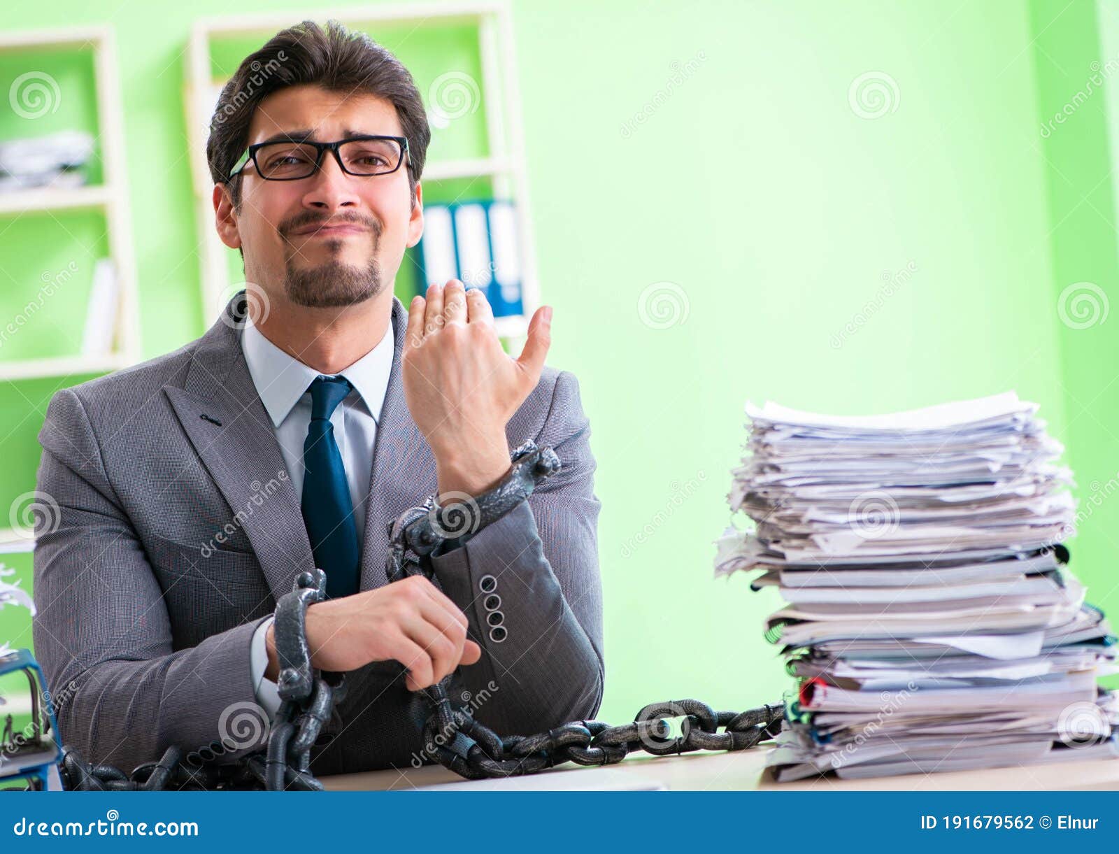 Employee Chained To His Desk Due To Workload Stock Photo - Image of ...