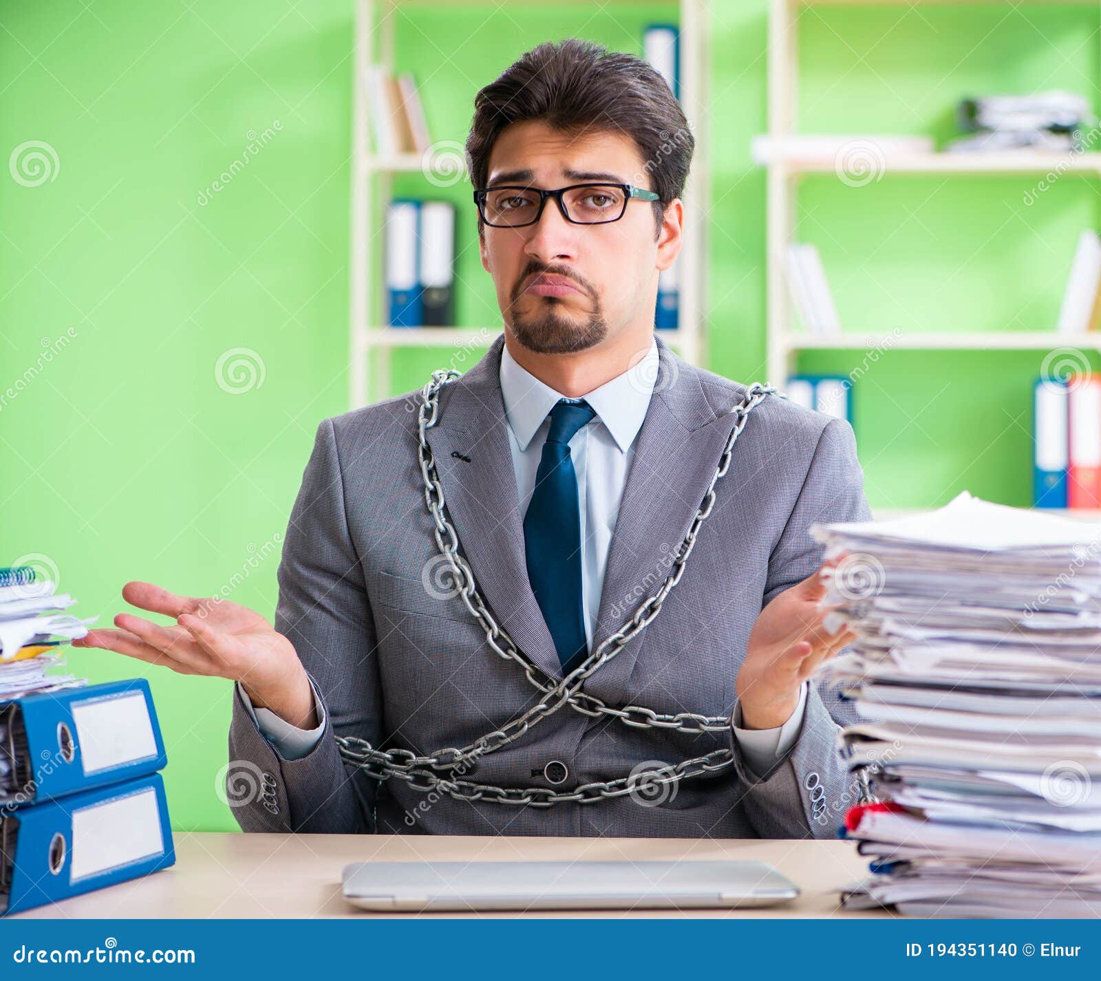 Employee Chained To His Desk Due To Workload Stock Photo - Image of ...